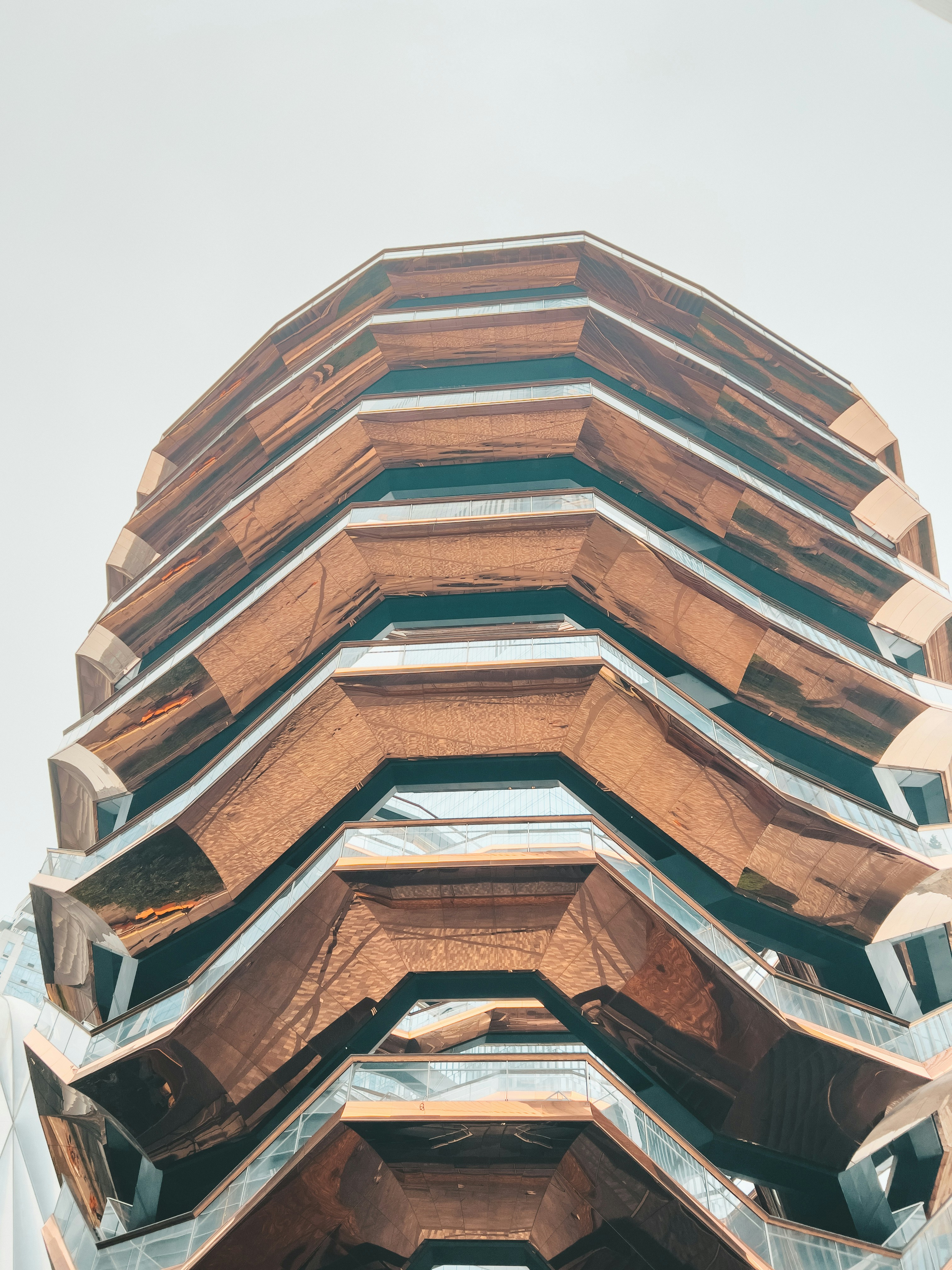 Cascading Hex Tower: Copper-Teal Repetition Reaches the Sky