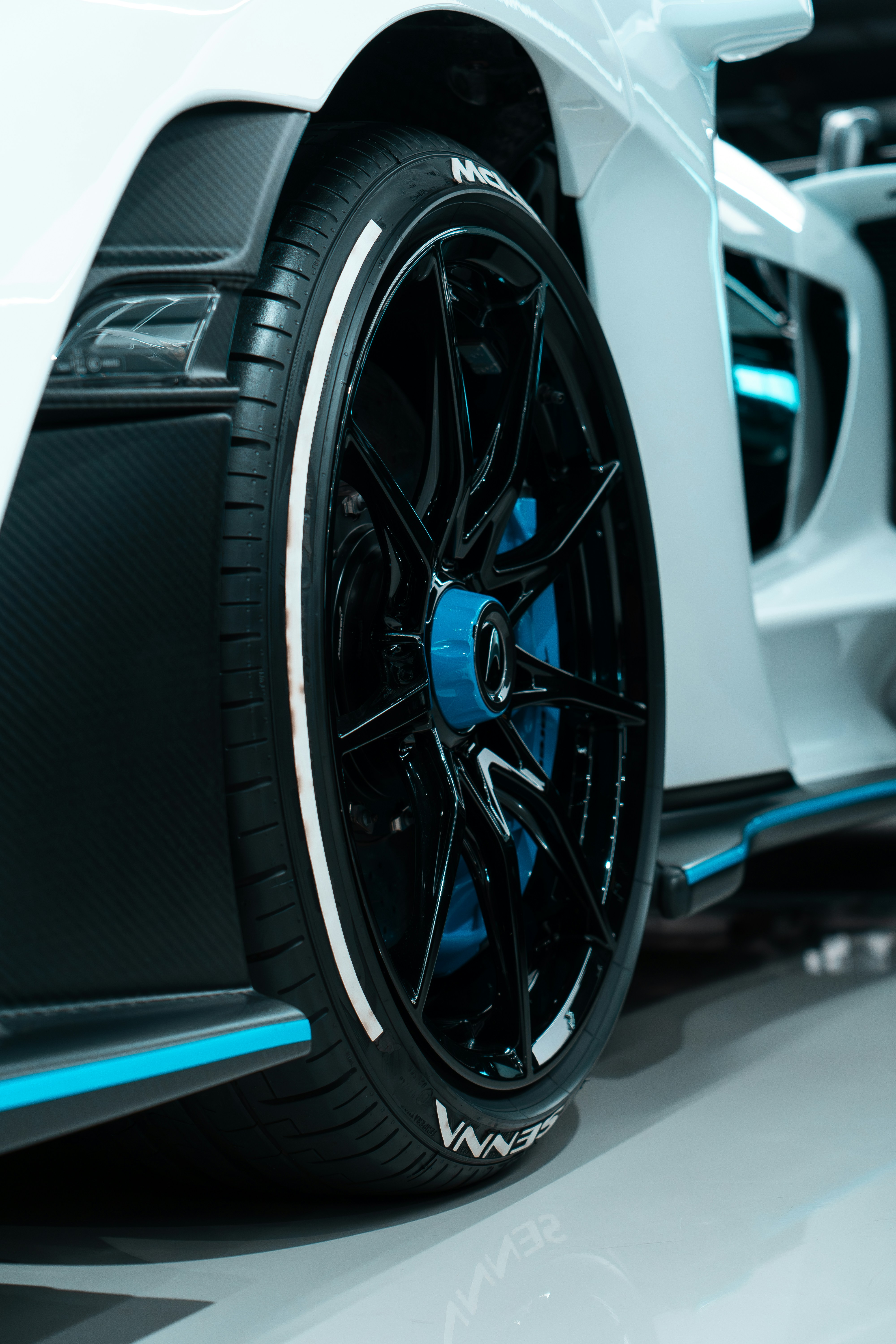 A close up of the front wheels of a sports car photo – Free Dubaï ...