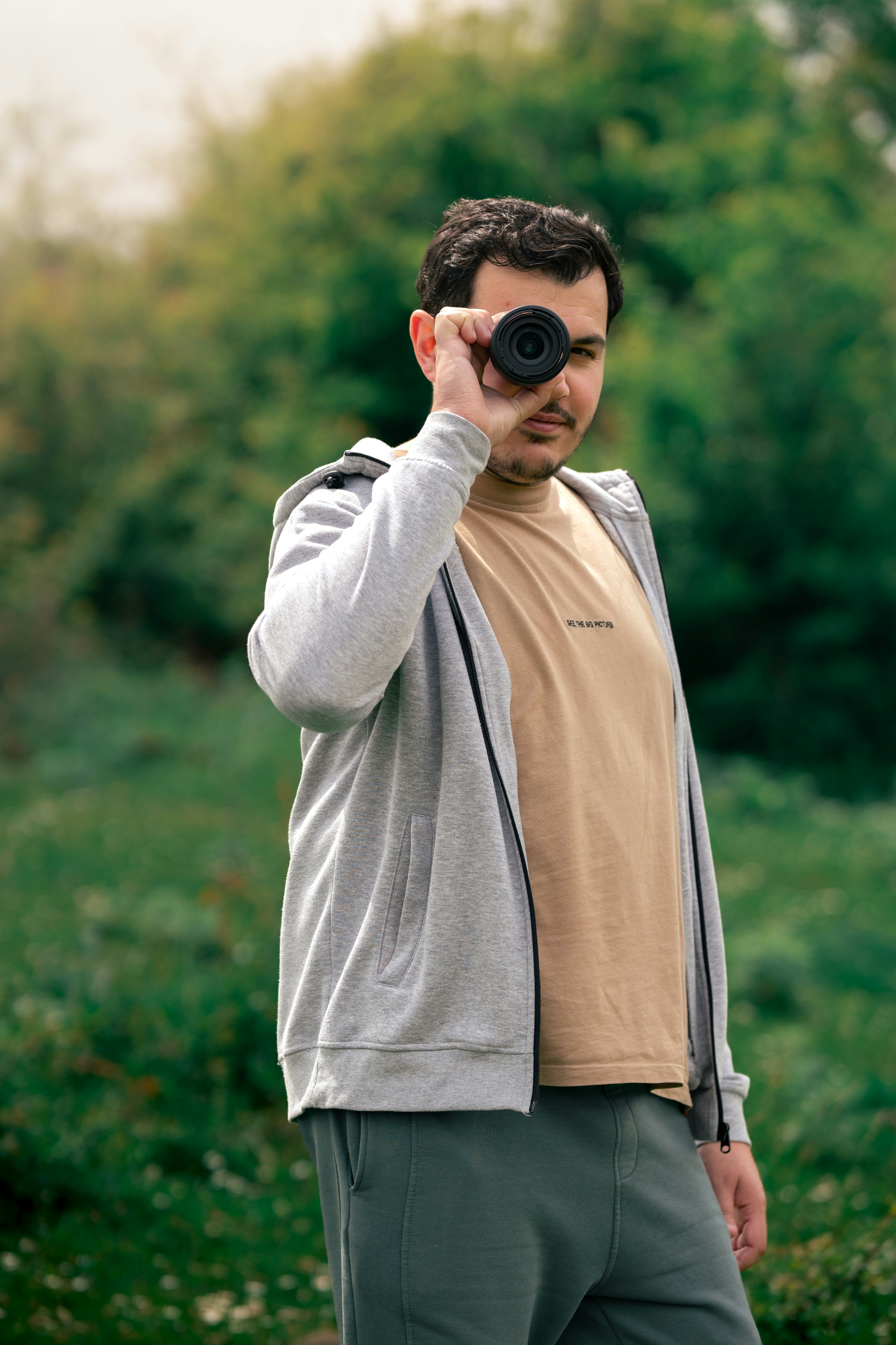 Parkside Click: A Casual Outdoor Portrait with a Handheld Camera
