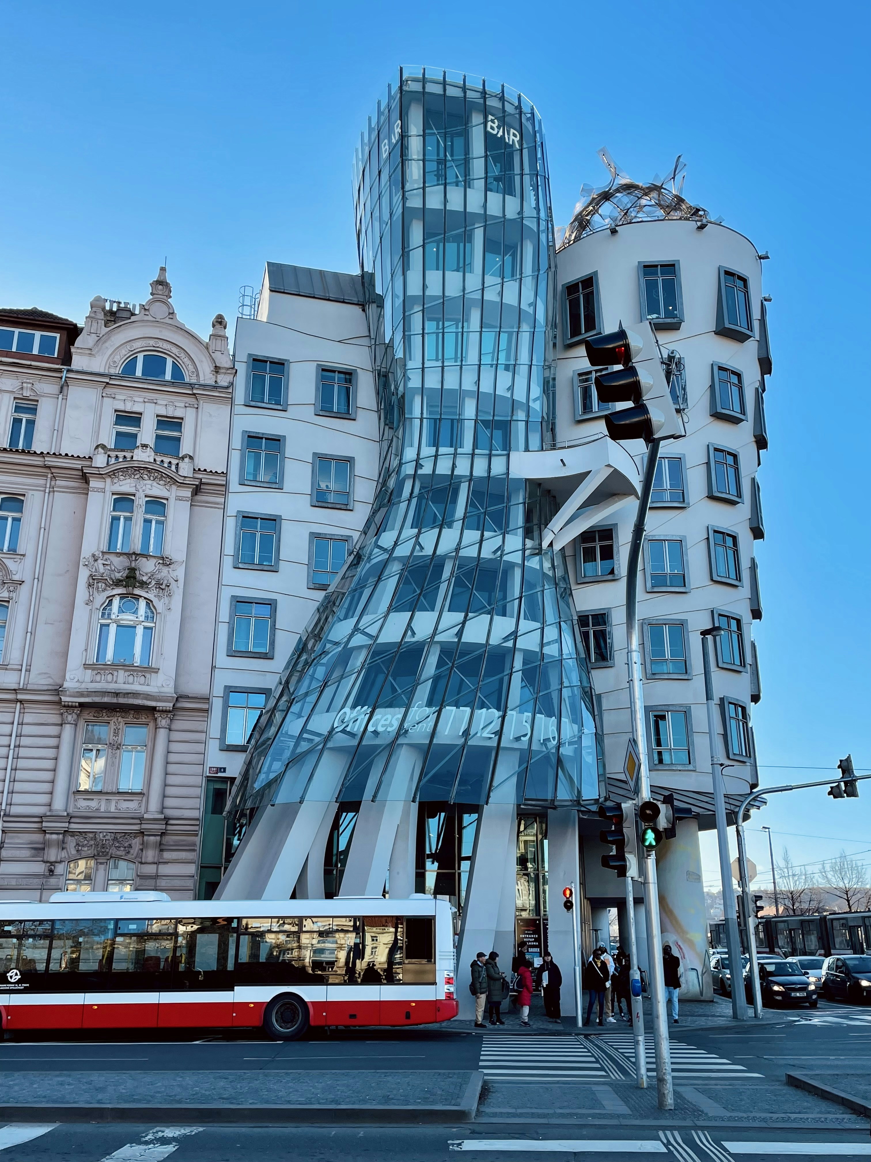 Spiral Glass Tower Tangos with Prague’s Dancing House