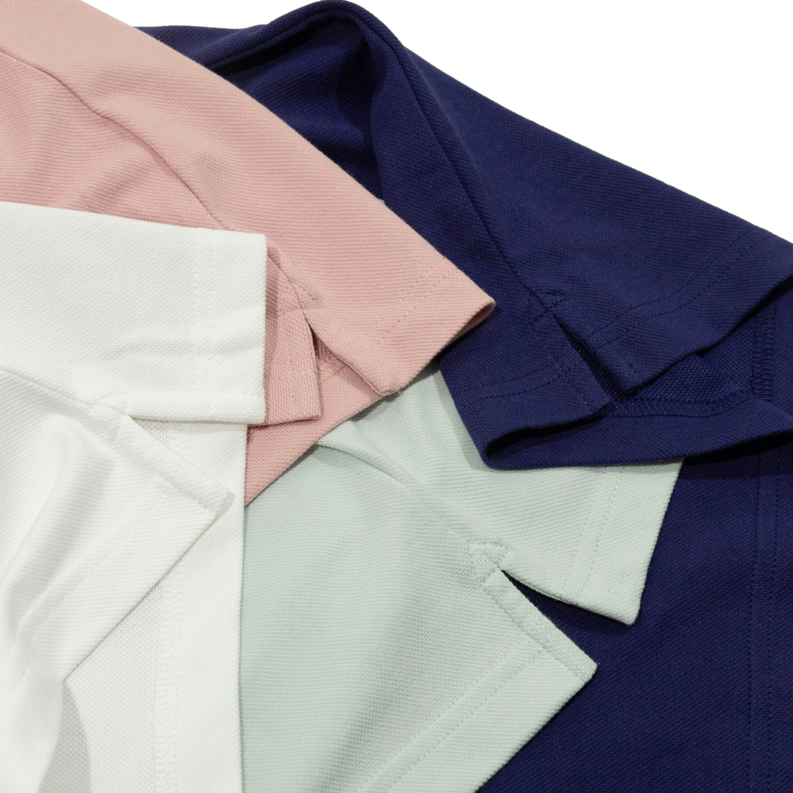 A close up of three different colored shirts photo – Free Grey Image on ...
