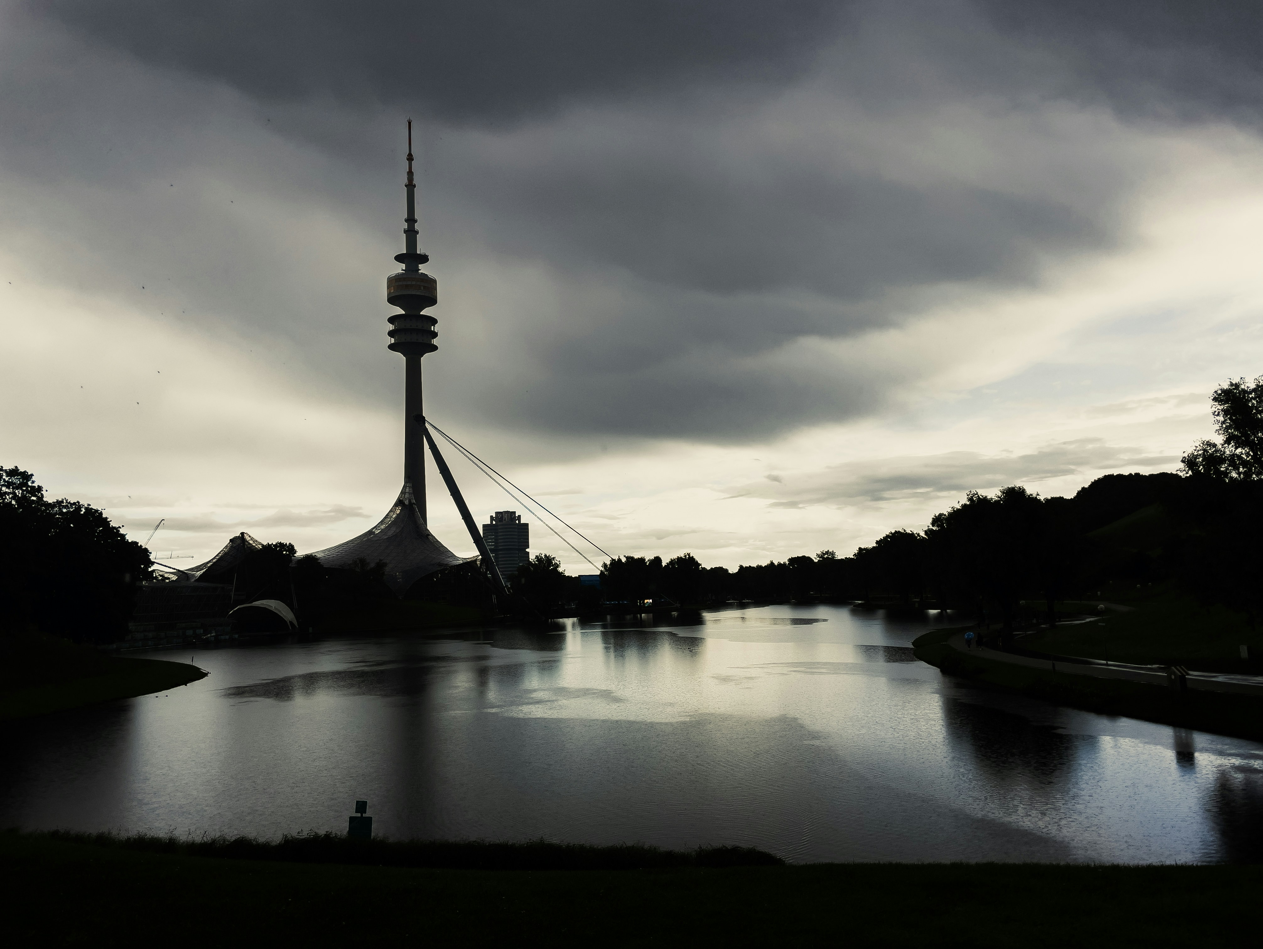 Dusk Silhouette by the Spire: Twilight on the Quiet Lakeside