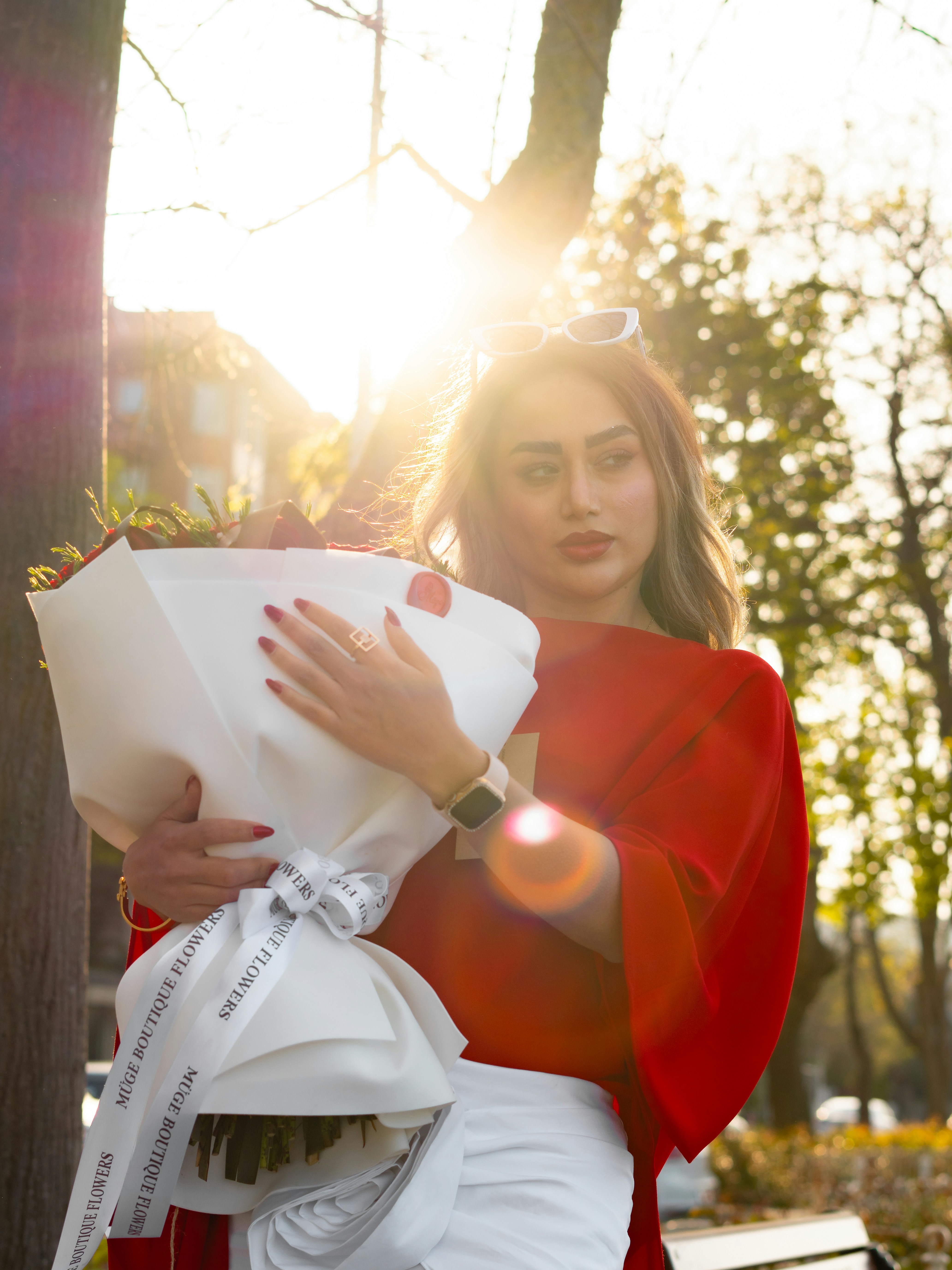 Crimson Drapes and White Bouquet in a Golden Backlight