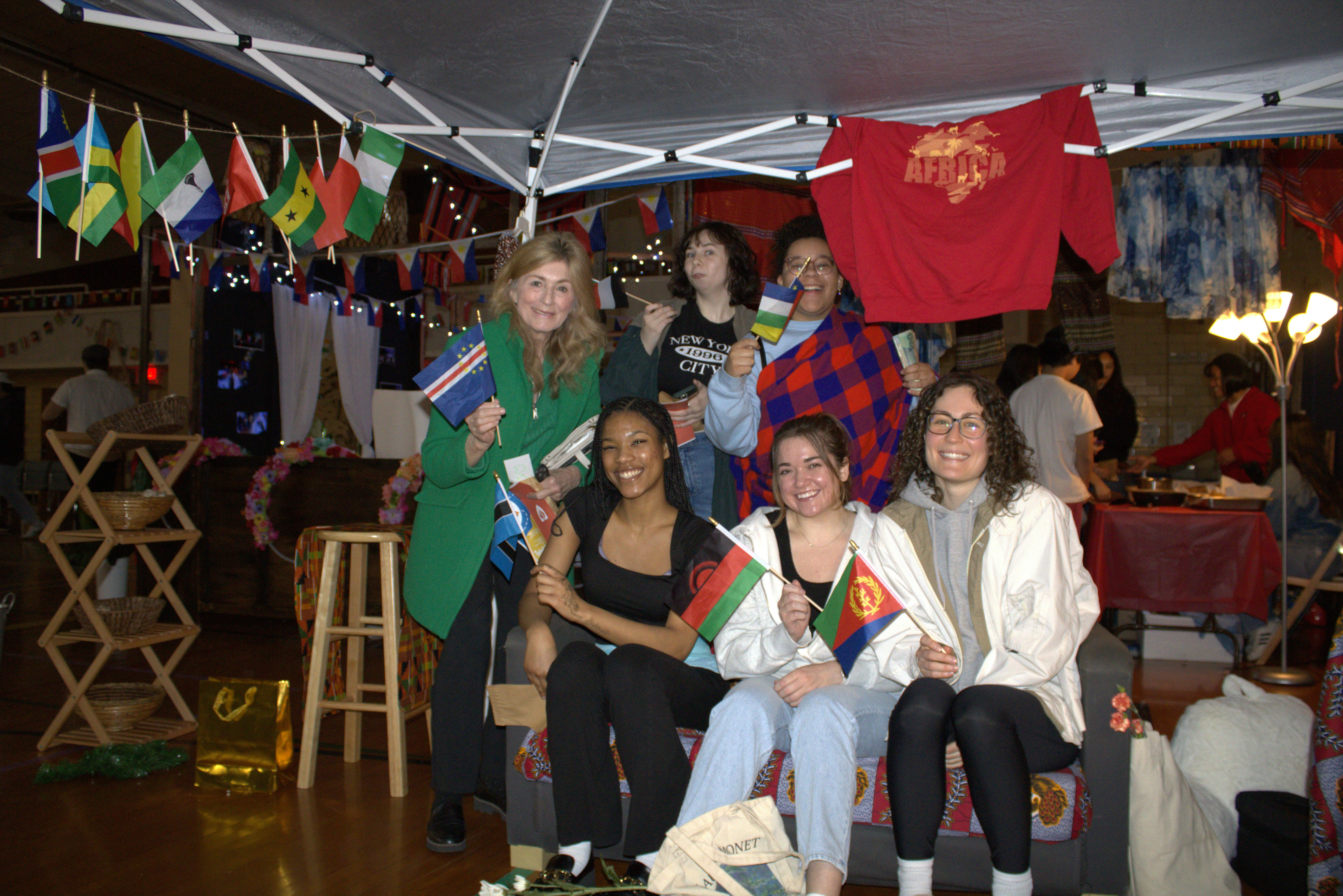 A group of women holding flags and posing for a picture photo – Free ...