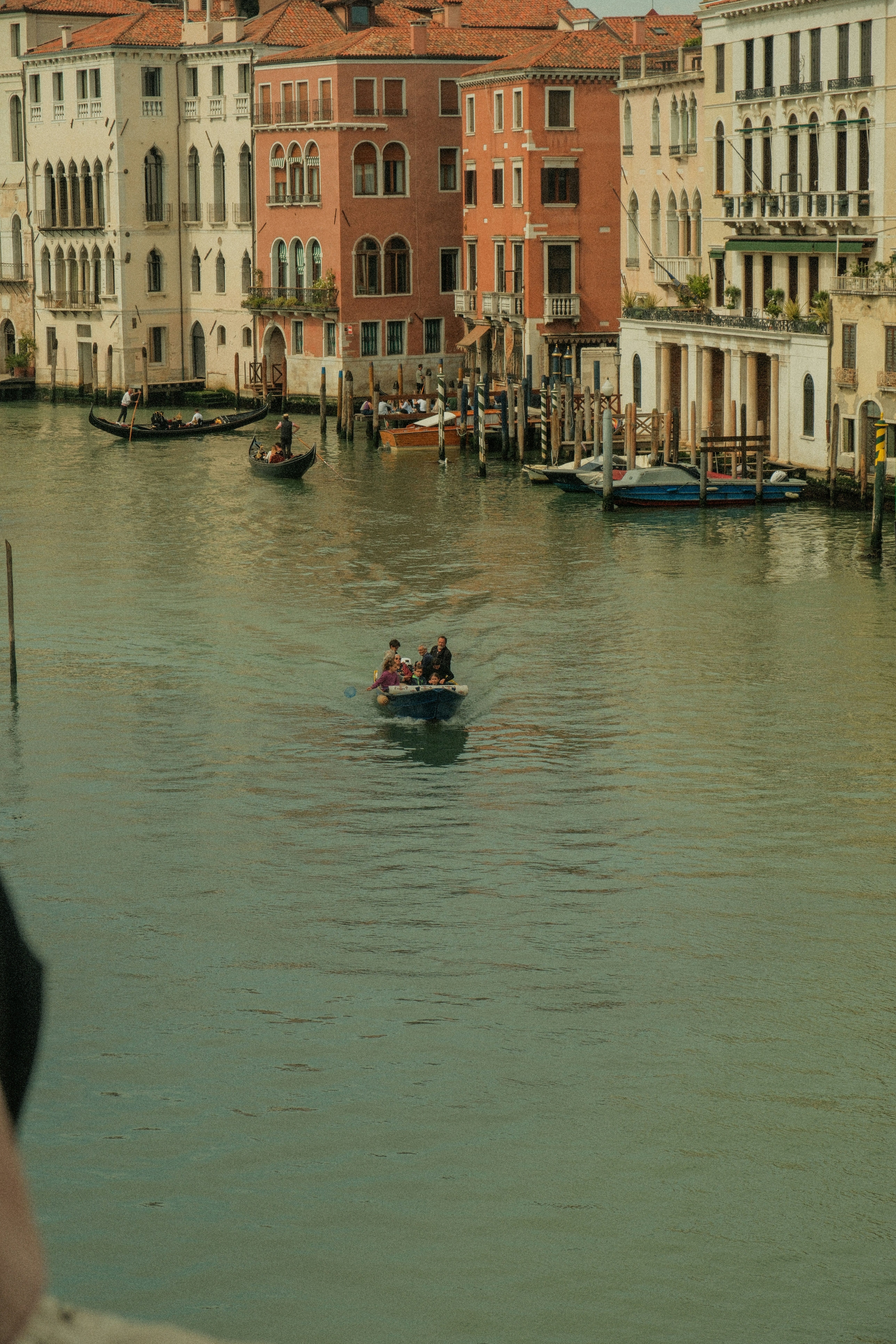 Gondola Wake Between Pastel Palazzi on a Venetian Canal
