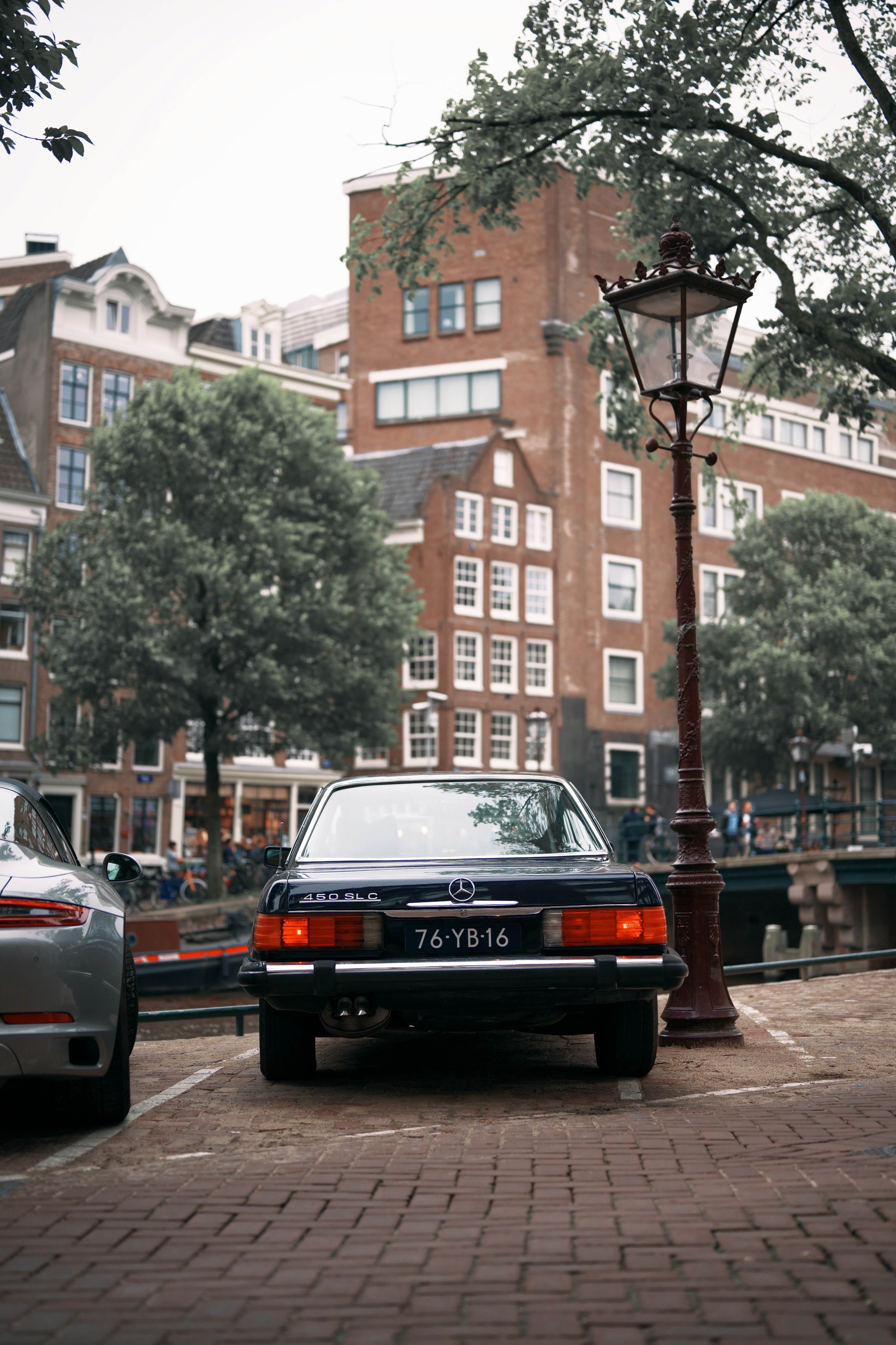 Brick Street Reverie: Vintage Mercedes by a Dutch Canal