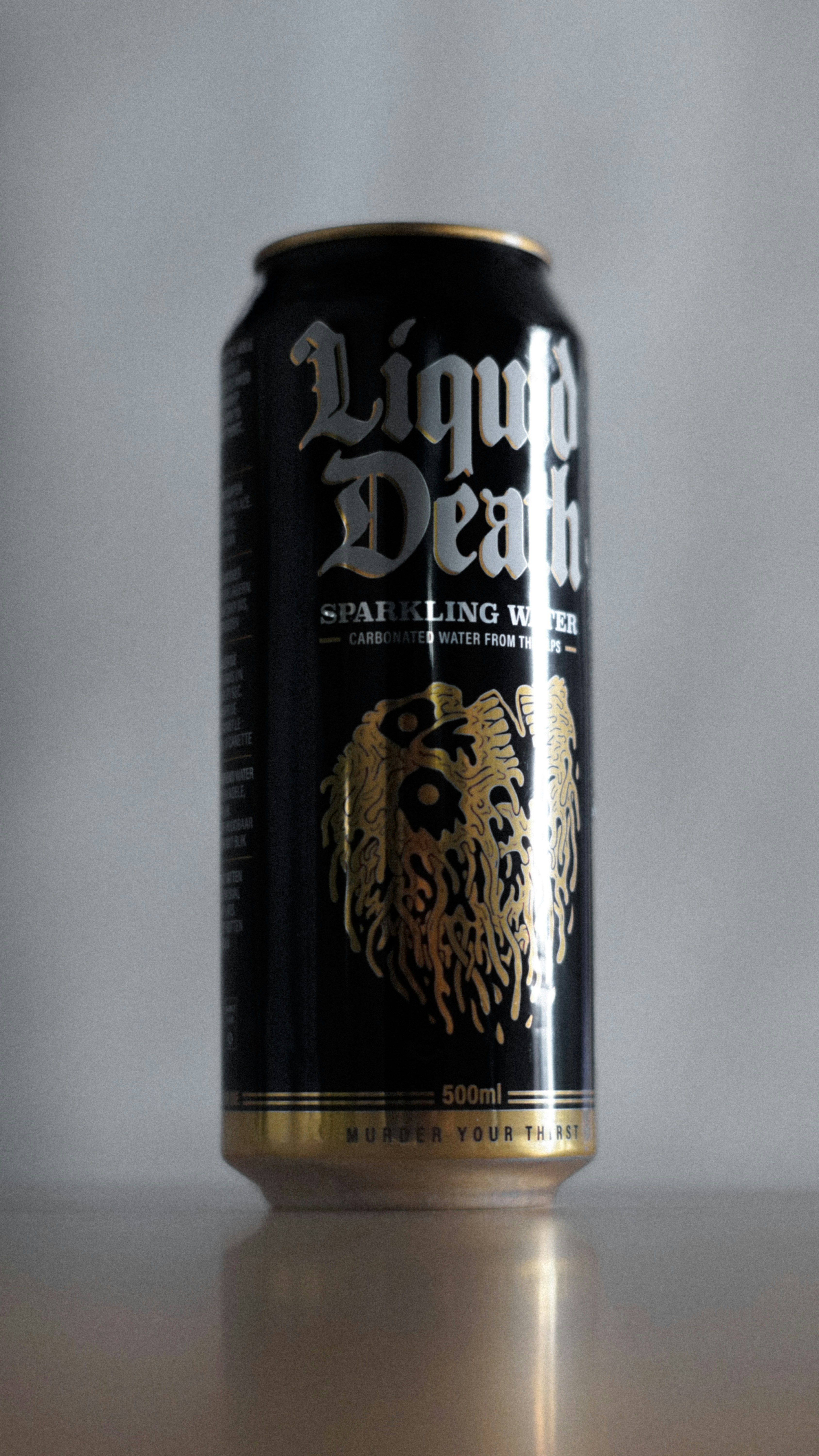 A can of liquid death sitting on a table photo – Free Can Image on Unsplash