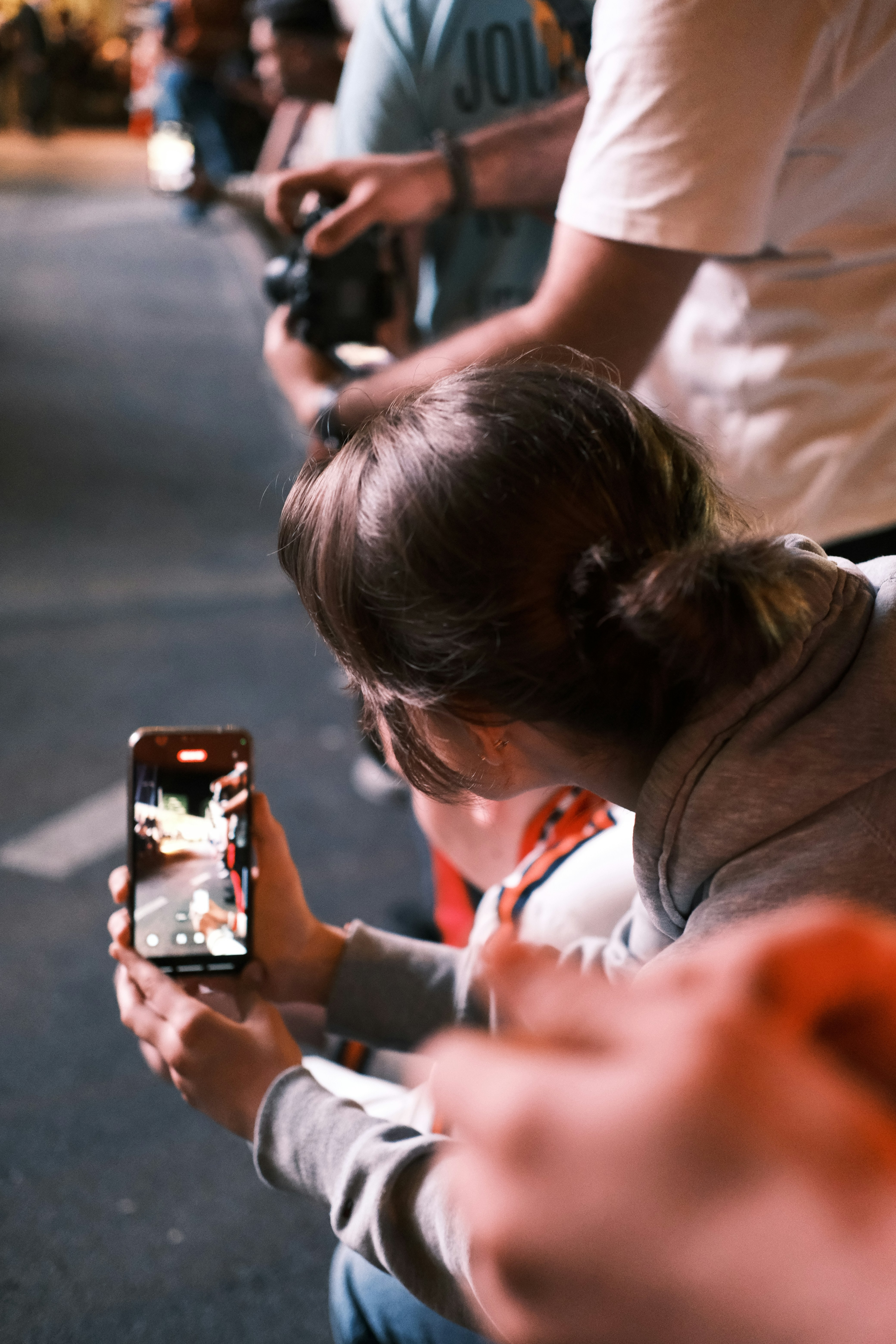 A woman taking some photos with cellphone