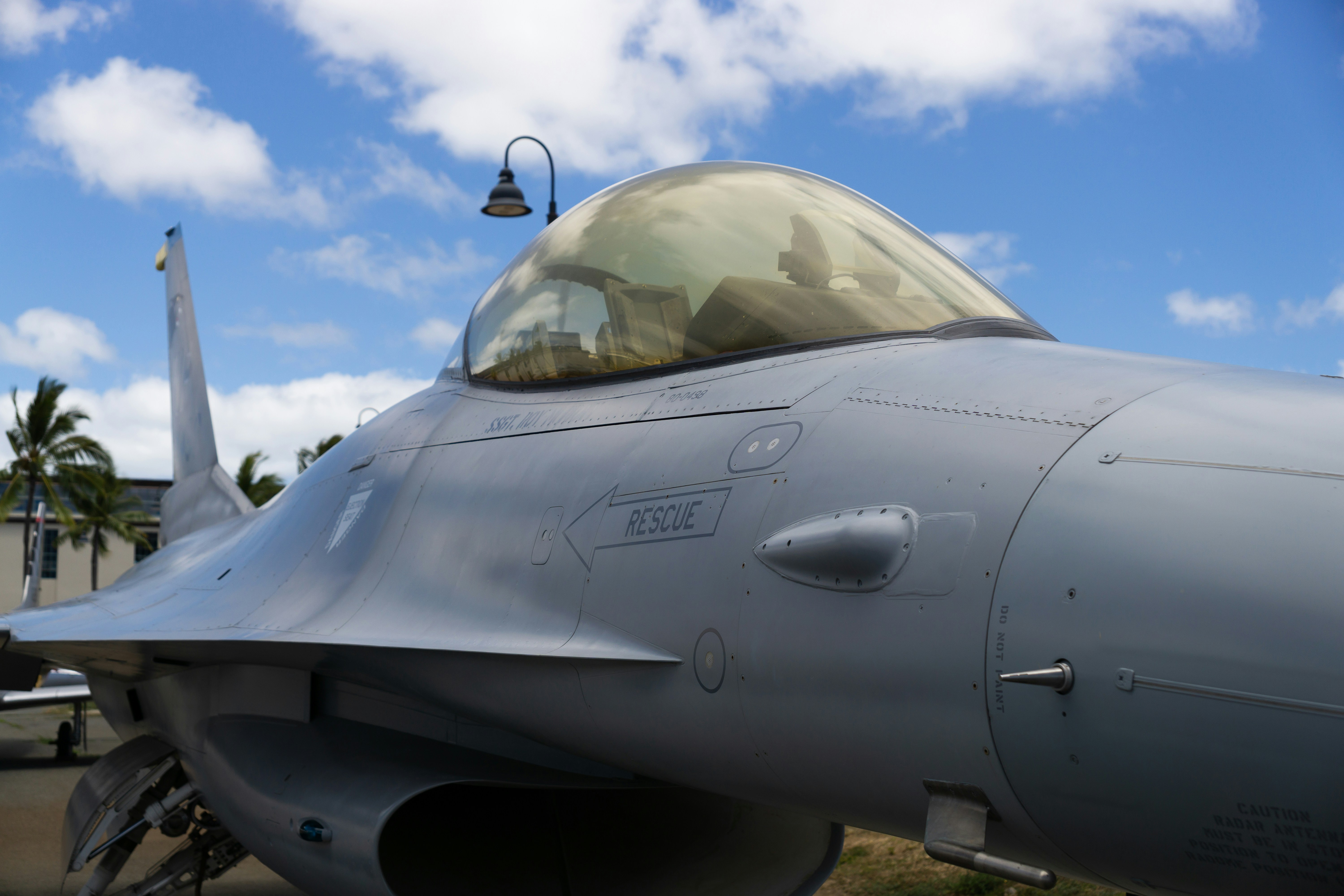 A fighter jet sitting on top of a tarmac photo – Free Pearl harbor ...