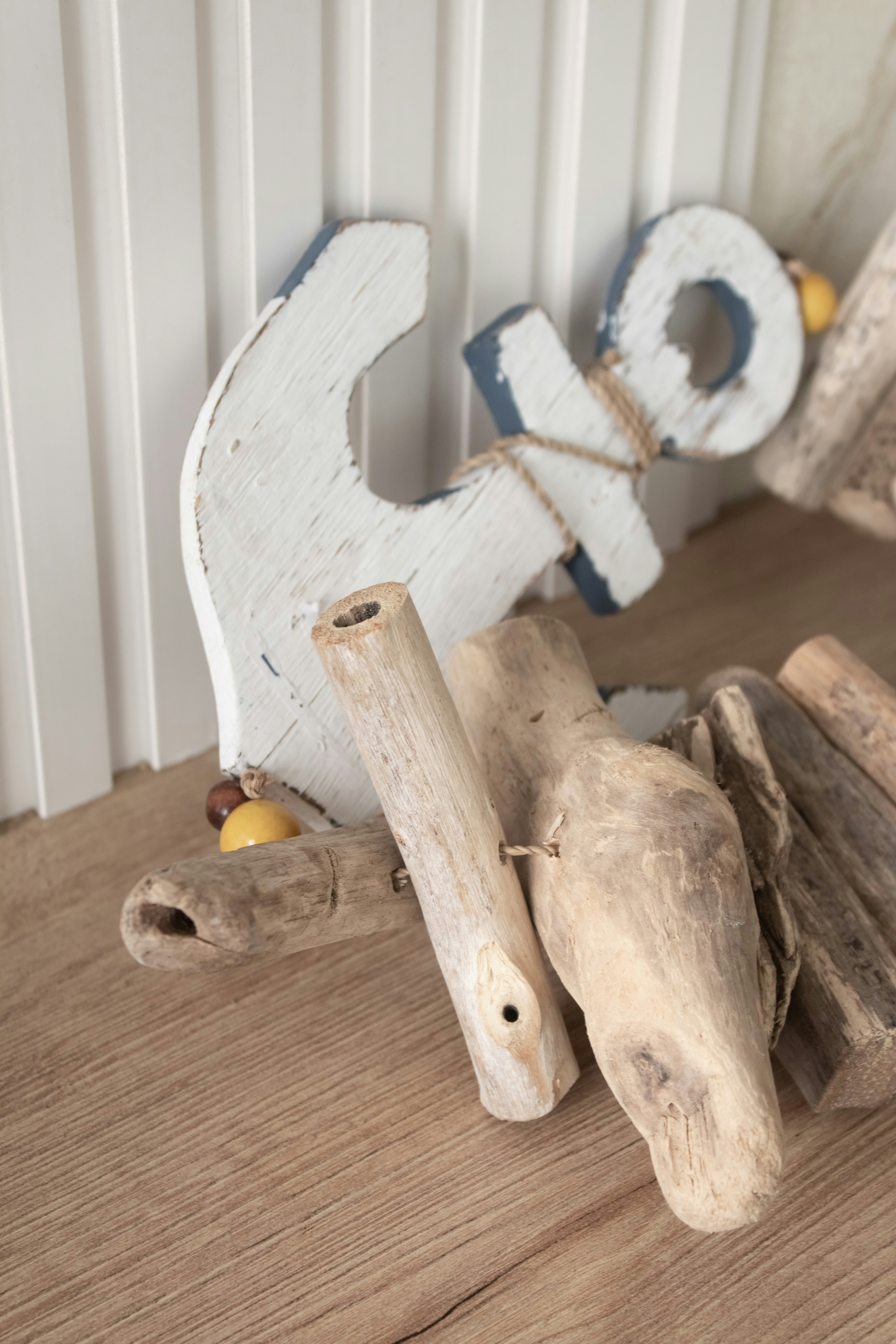 Weathered Driftwood and Chalky Letters in Soft, Rustic Light