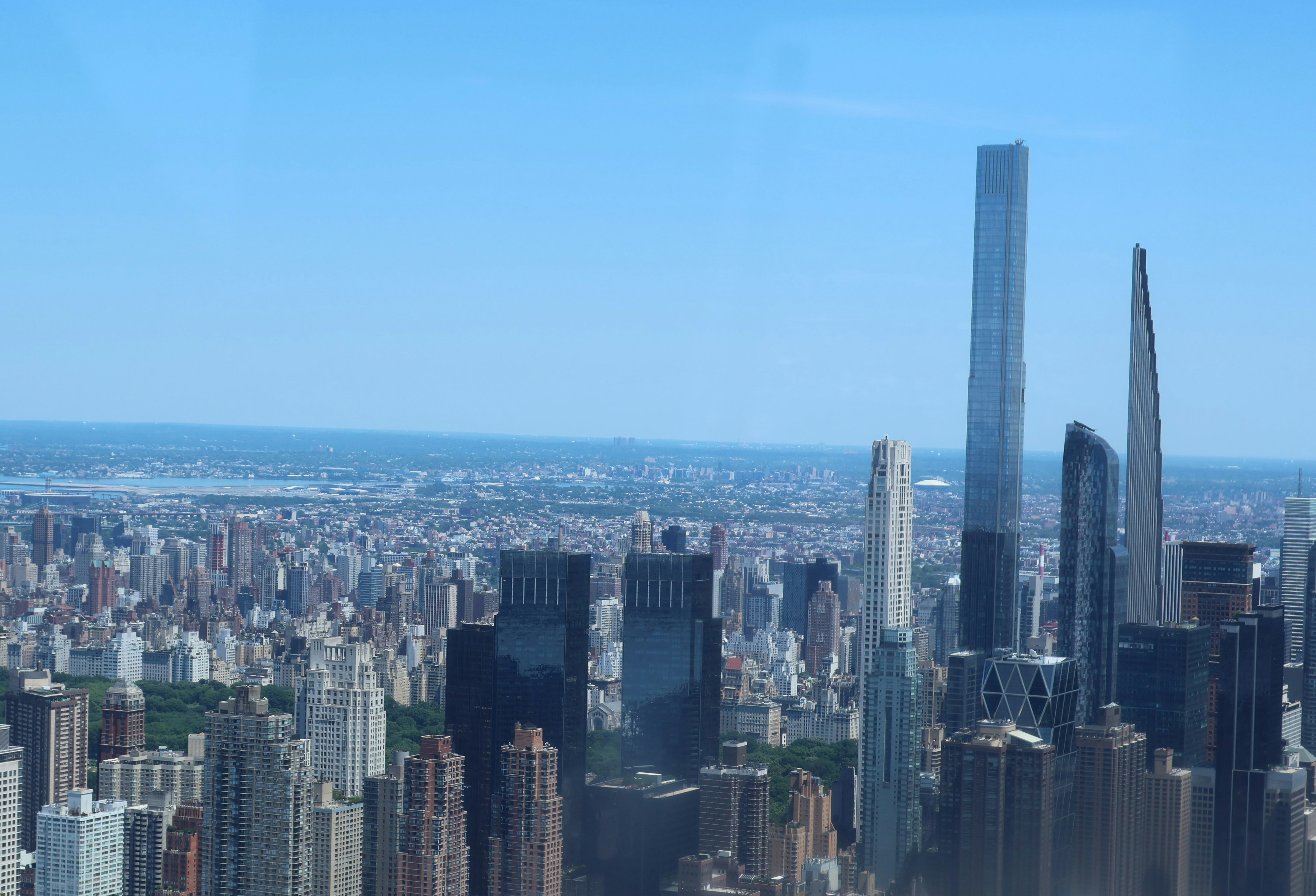 A view of a city from the top of a skyscraper photo – Free New york ...
