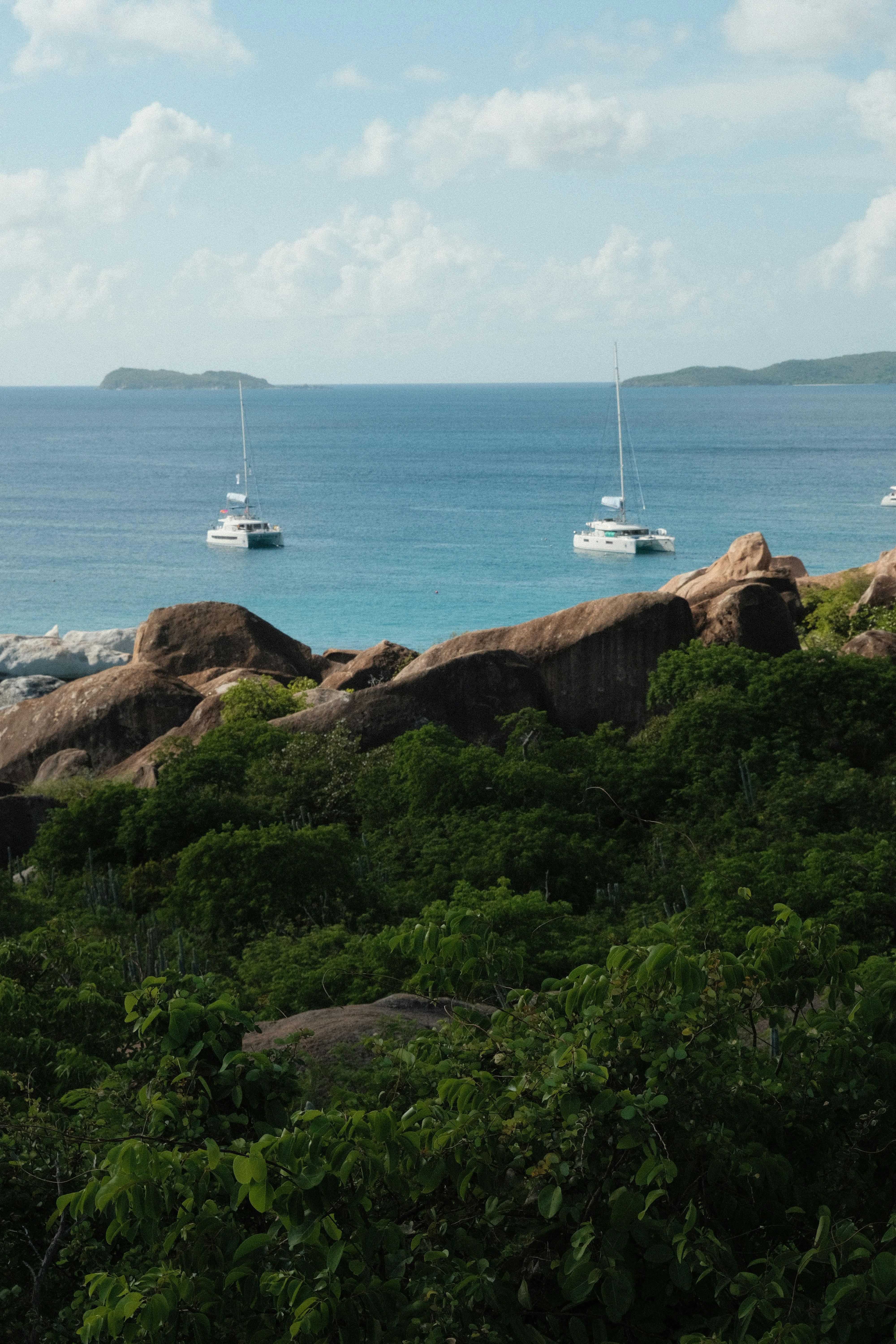 Boats Rest Over a Rugged Caribbean Foreshore