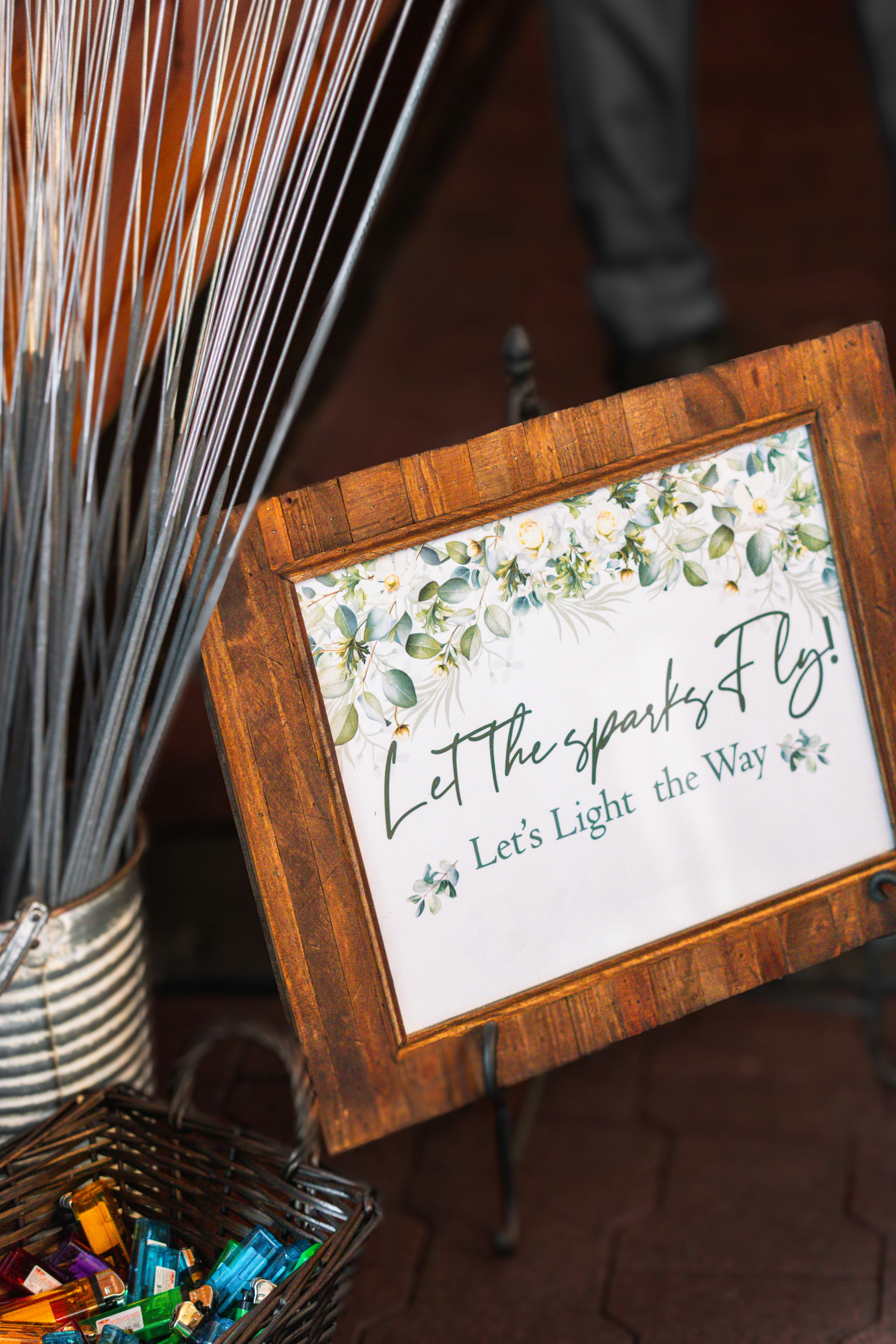 Let the Sparks Fly: A Rustic Framed Sign Illuminating the Way