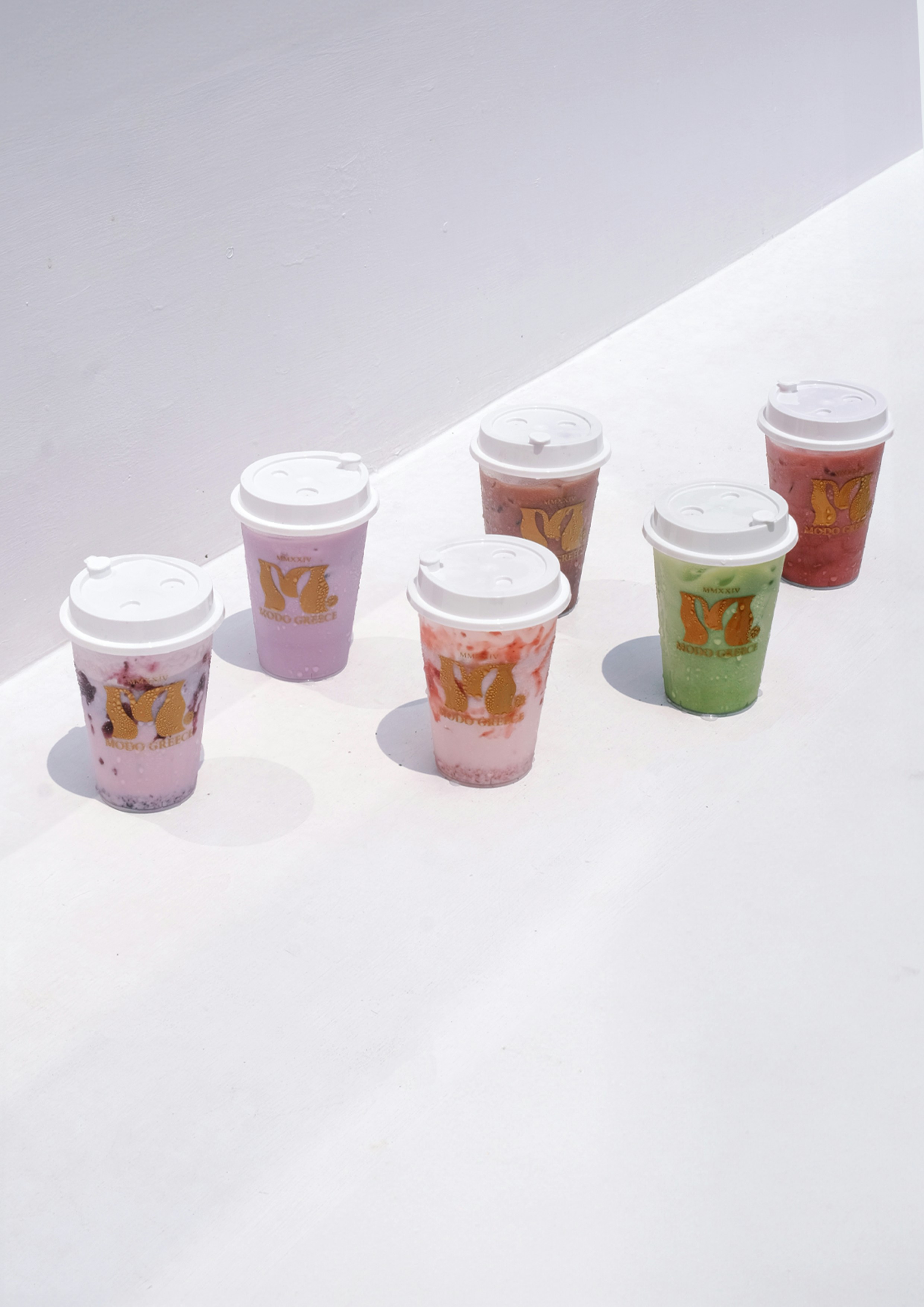 A group of cups sitting next to each other photo – Free Cup Image on ...