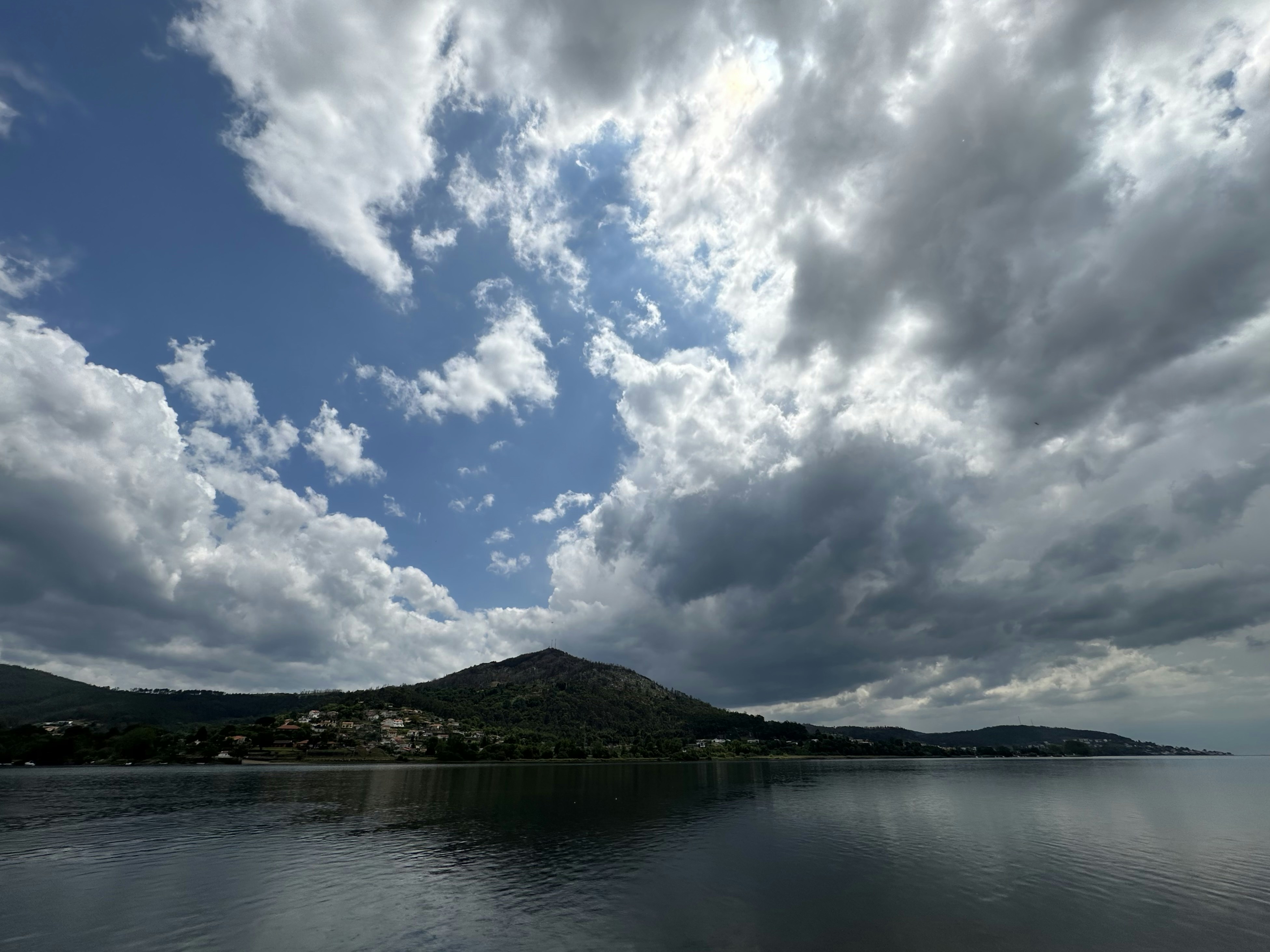Dramatic Skies Over Serene Waters