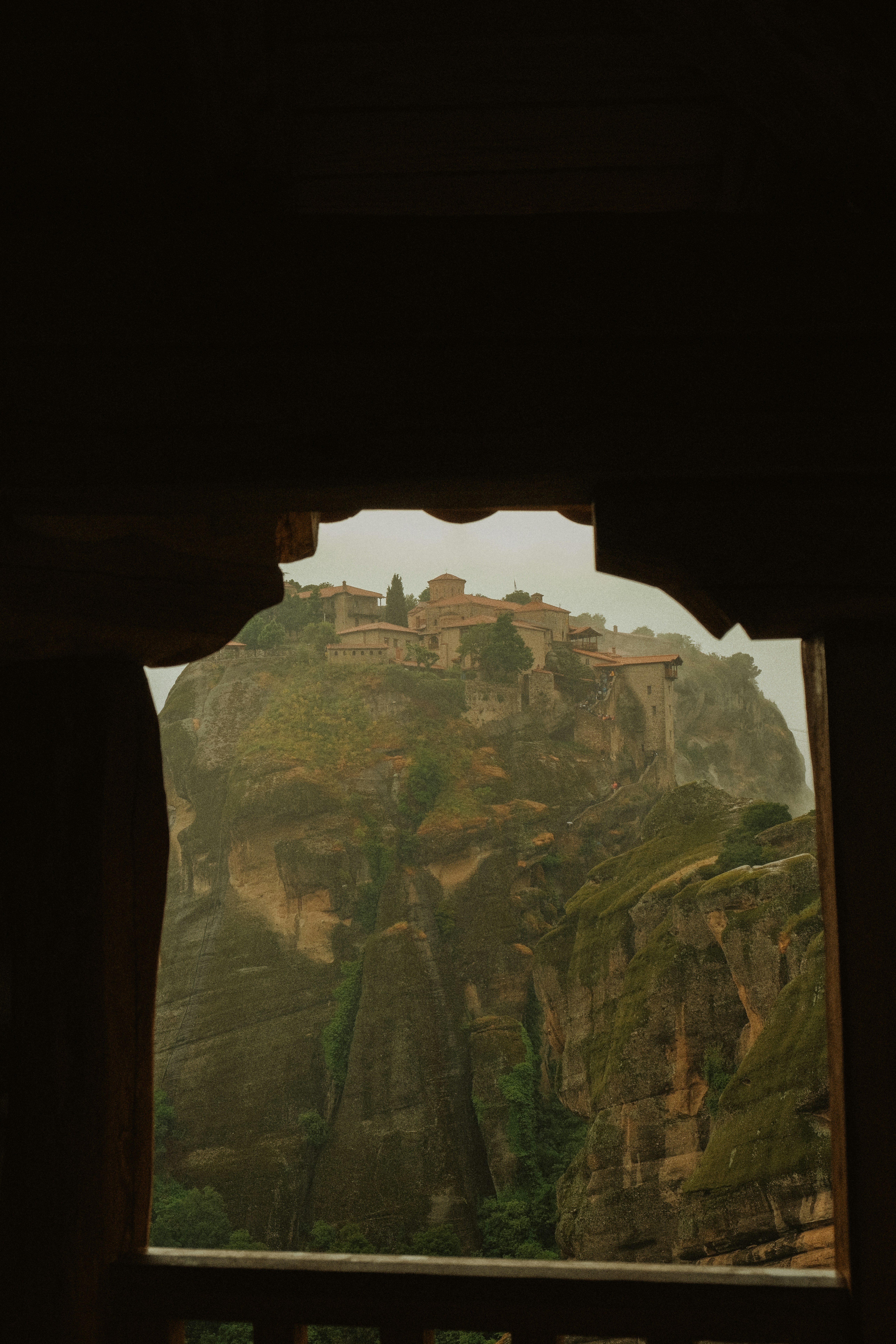 A view of a village from a window in a building photo – Free Meteora ...