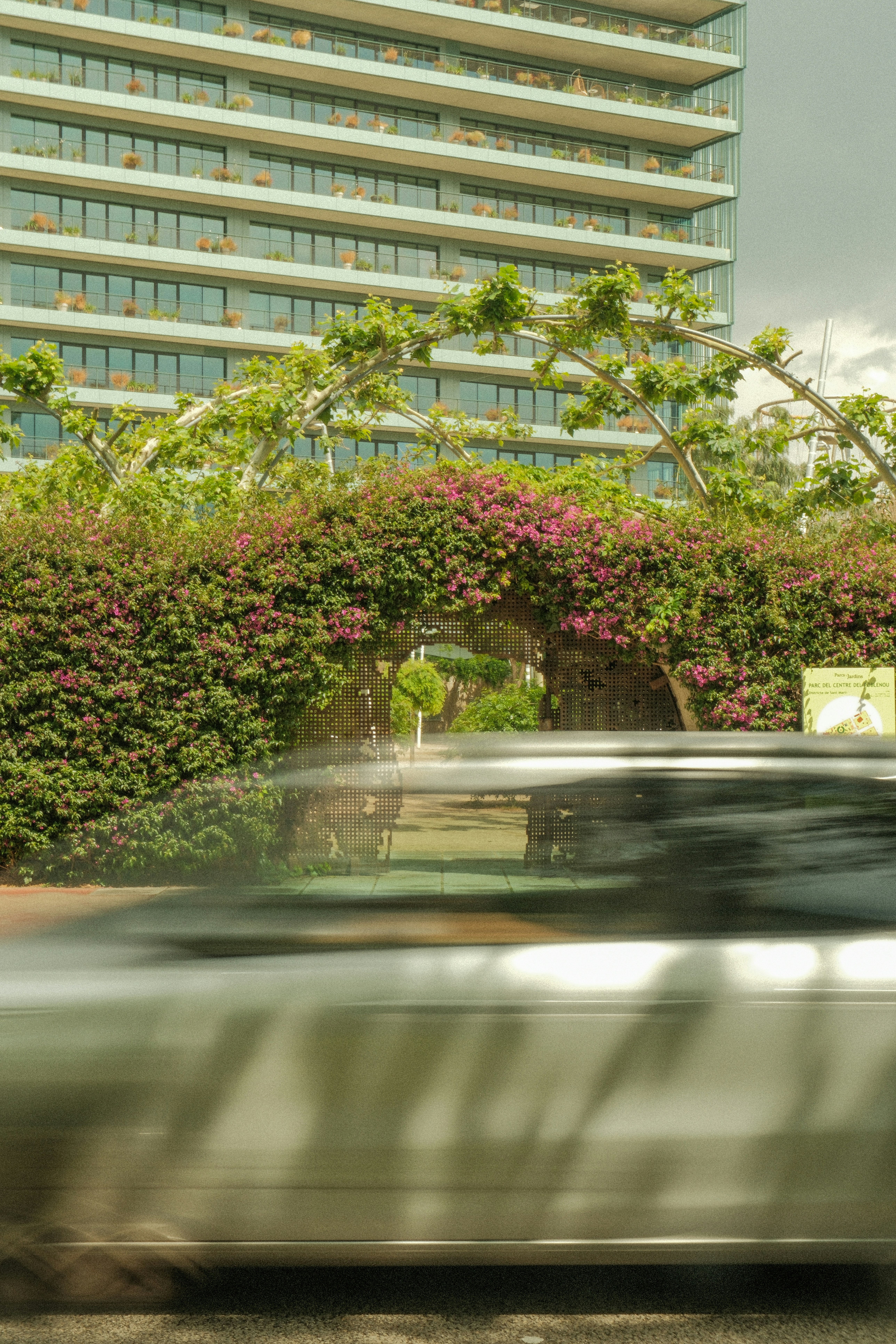 Motion Blur Under The Glass Canopy: Cityscape in Transit