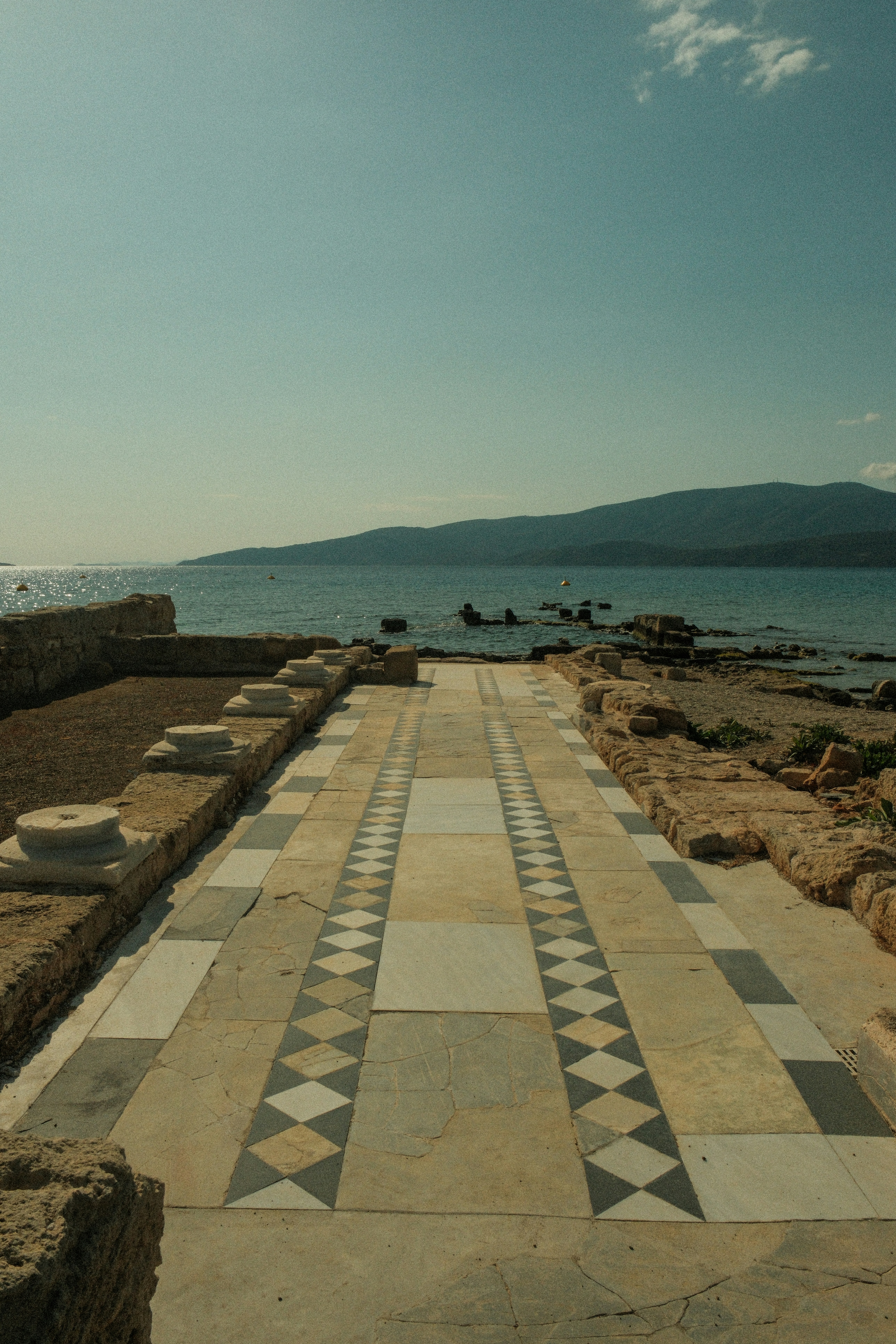 A walkway with a checkerboard pattern on it photo – Free Texture Image ...