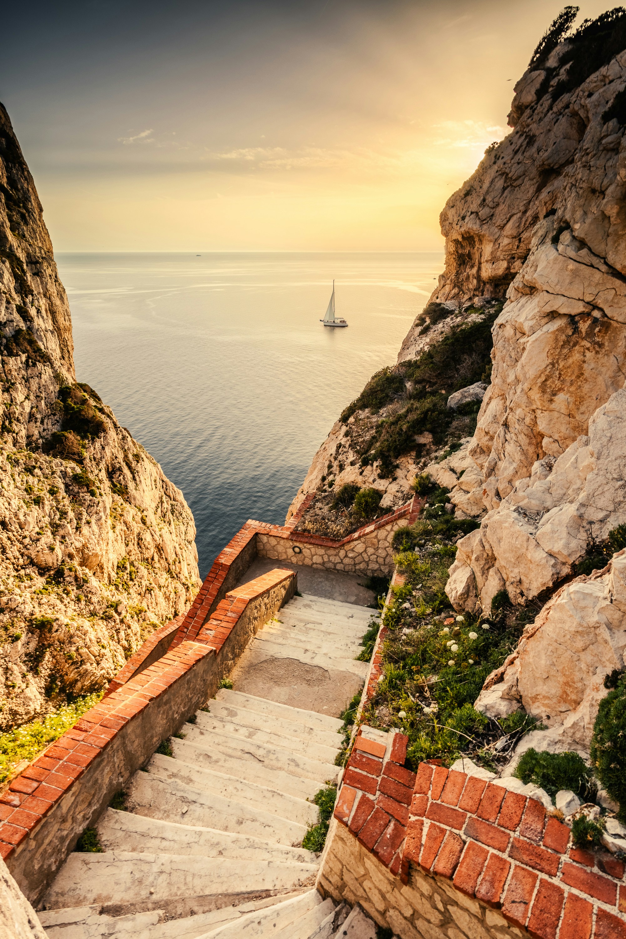 a stairway leading to a boat in the ocean