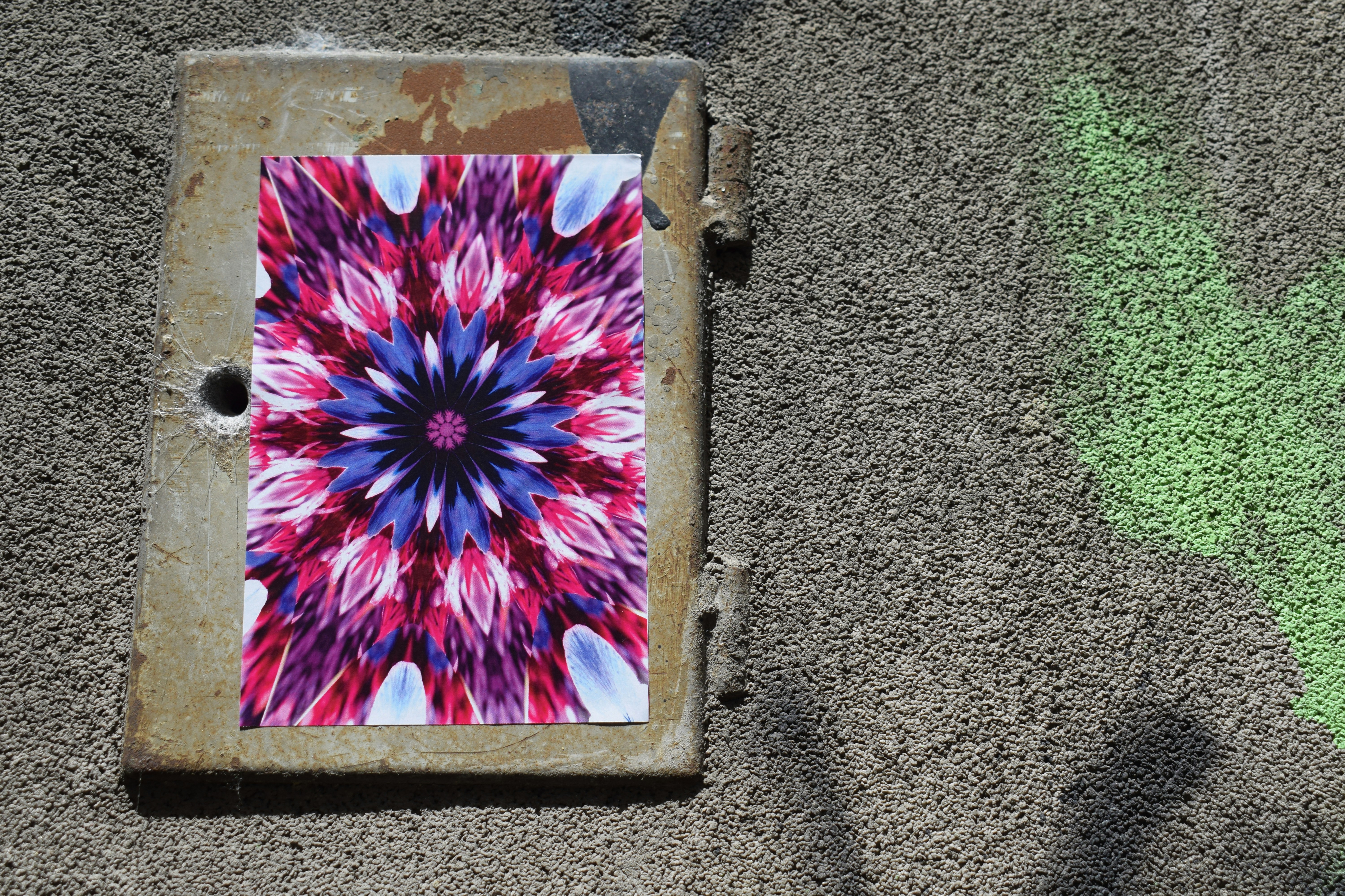 Kaleidoscope on Concrete: a Bold Geometric Poster on a Weathered Plate