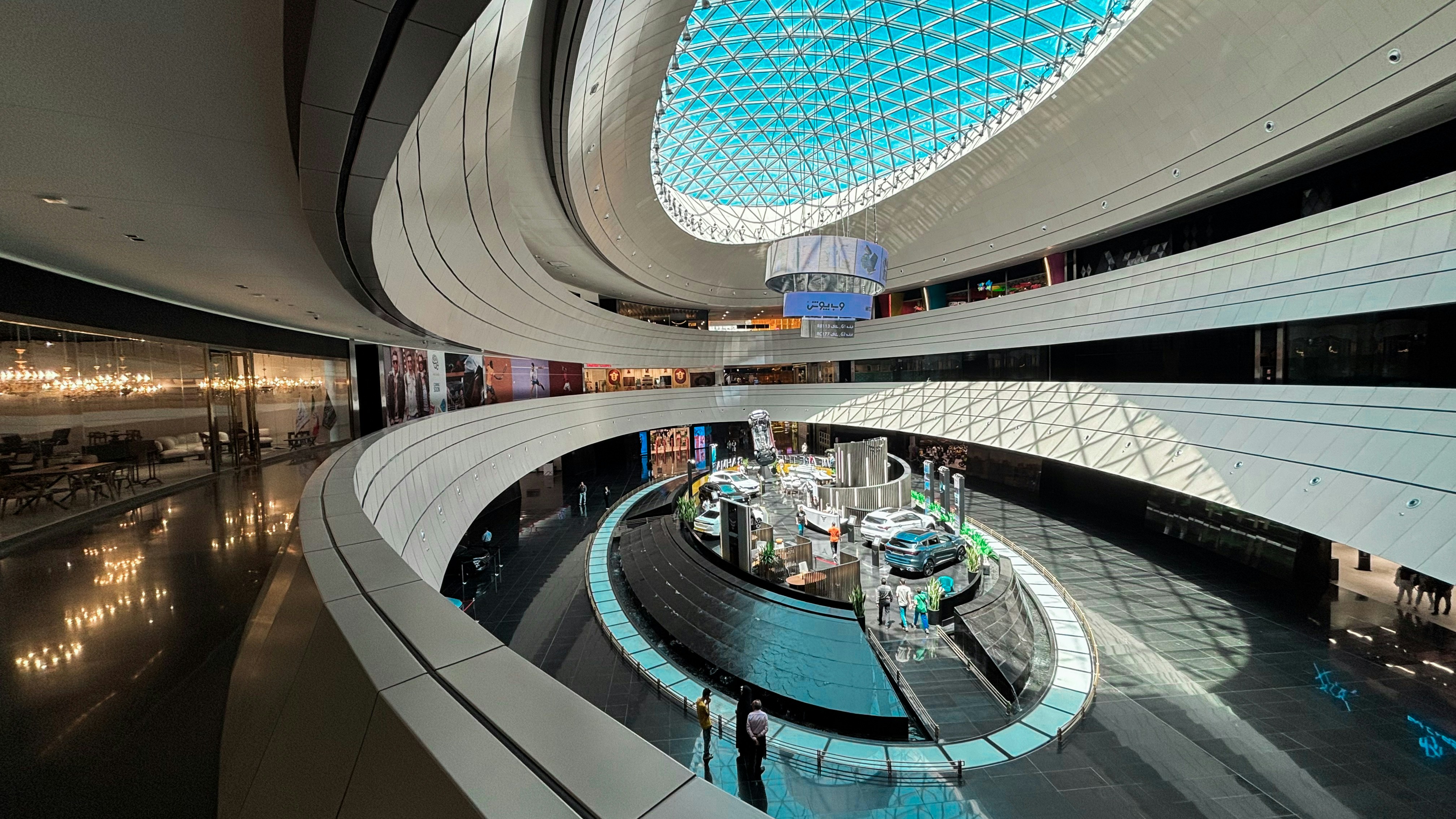 A large circular building with a skylight above it photo – Free Iran ...