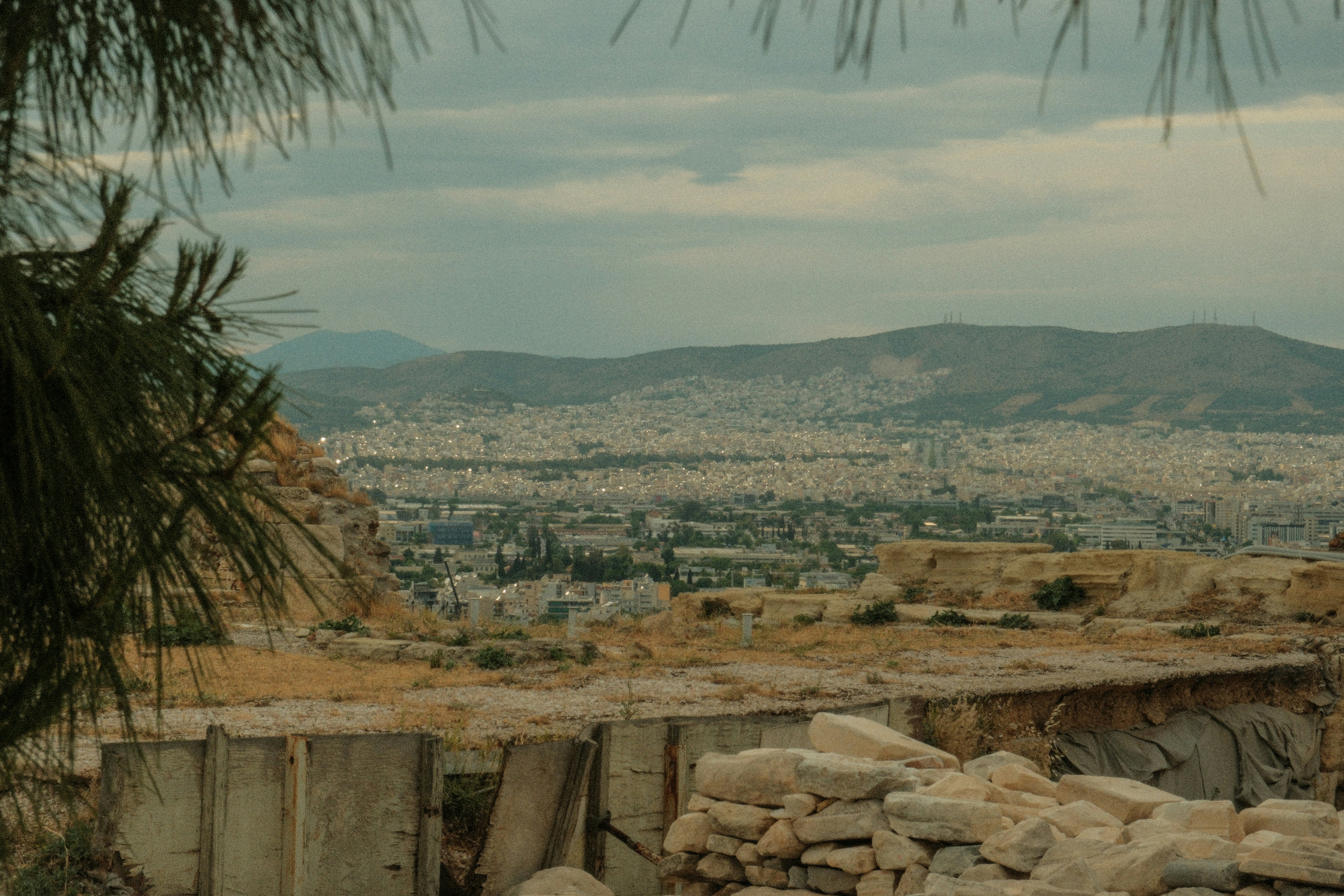 Deserted construction foreground with distant city and hills