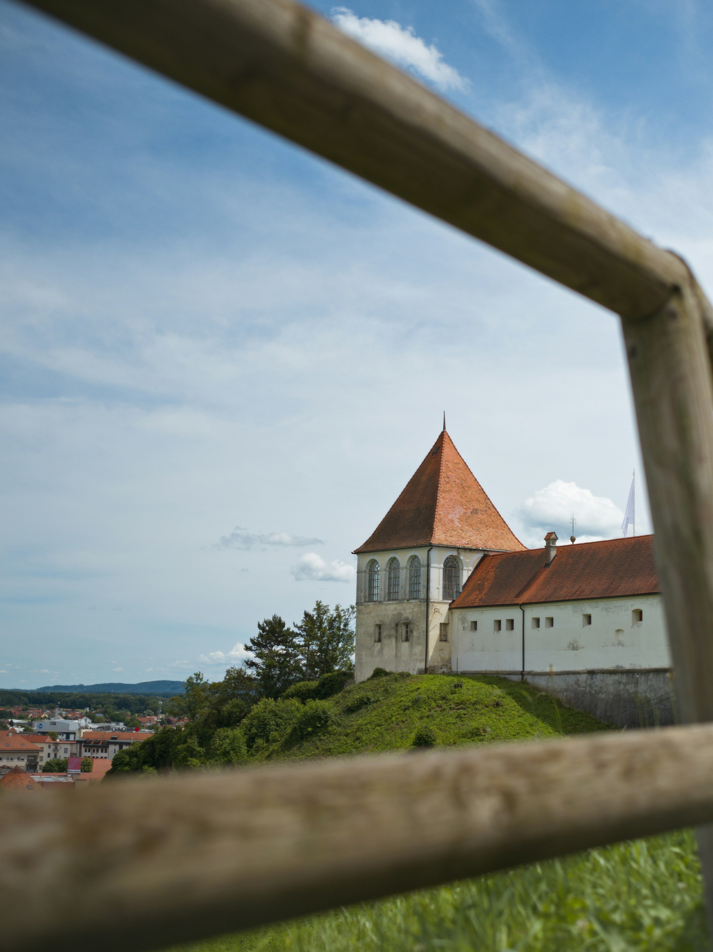 A view of a castle through a window photo – Free House Image on Unsplash