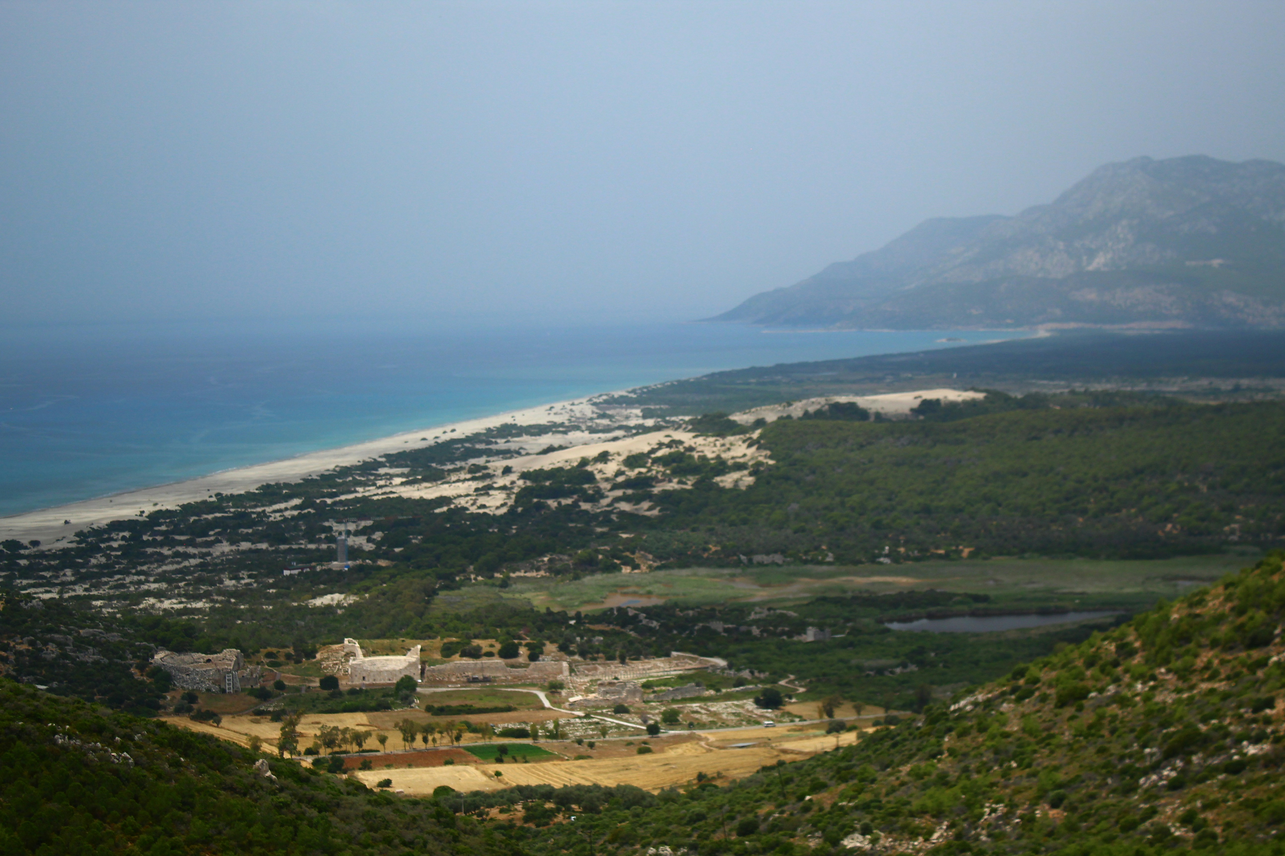 Coastal Village Nestled Between Shoreline and Hills