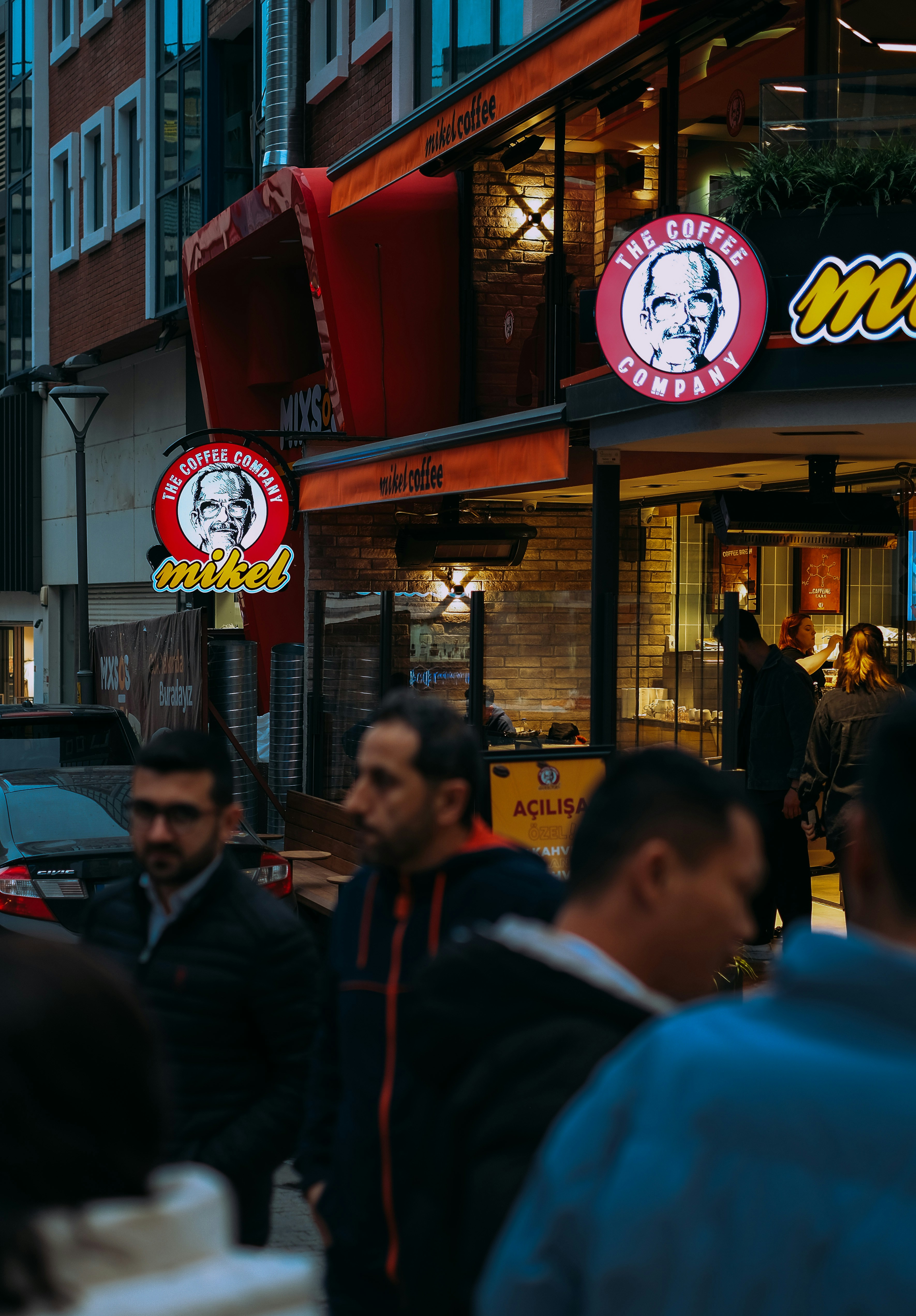 Cafe Neon: The Coffee Lanterns and Evening Crowd