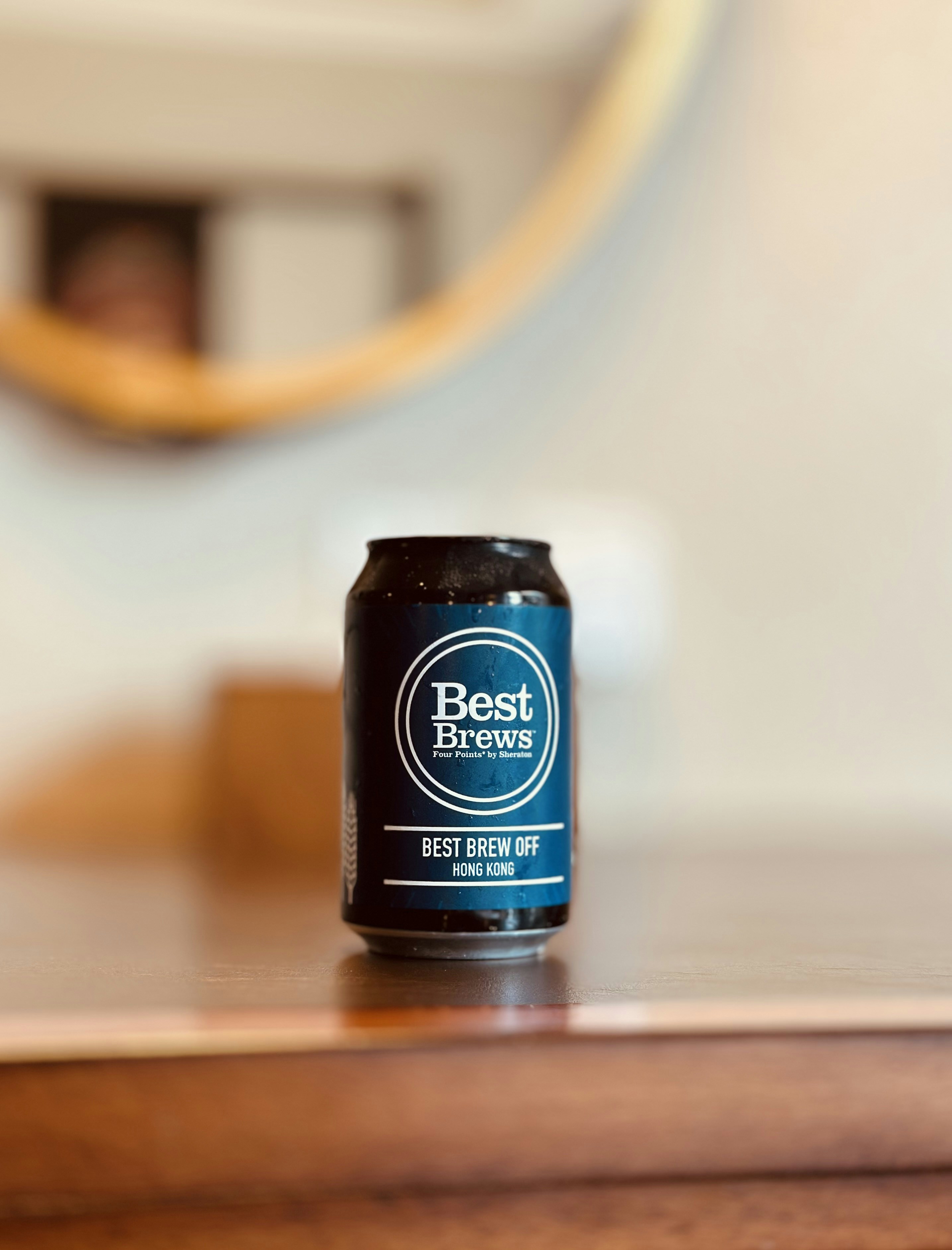 A can of beer sitting on top of a wooden table photo – Free Beer Image ...