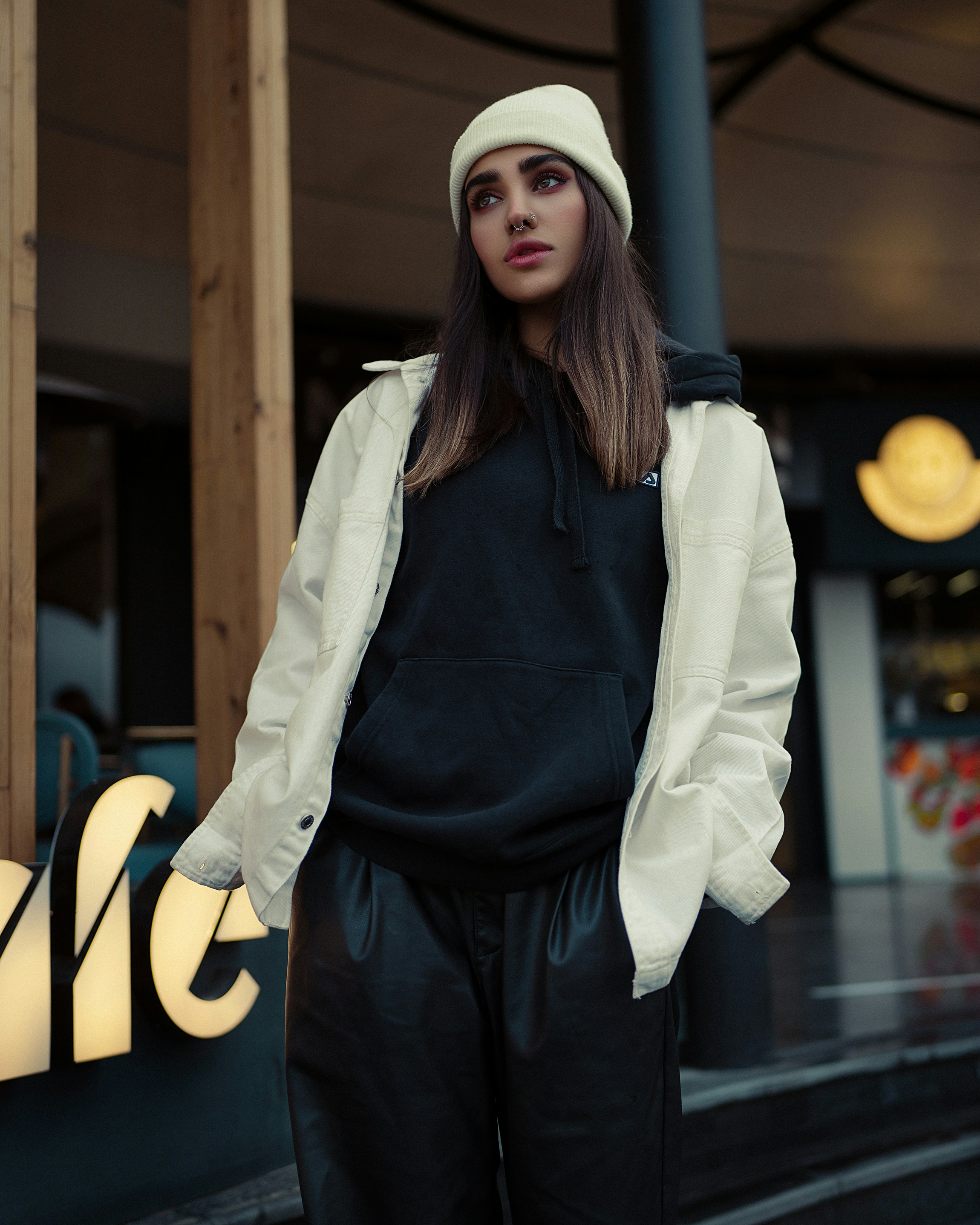 A woman wearing a white hat and black outfit photo – Free Fashion Image ...