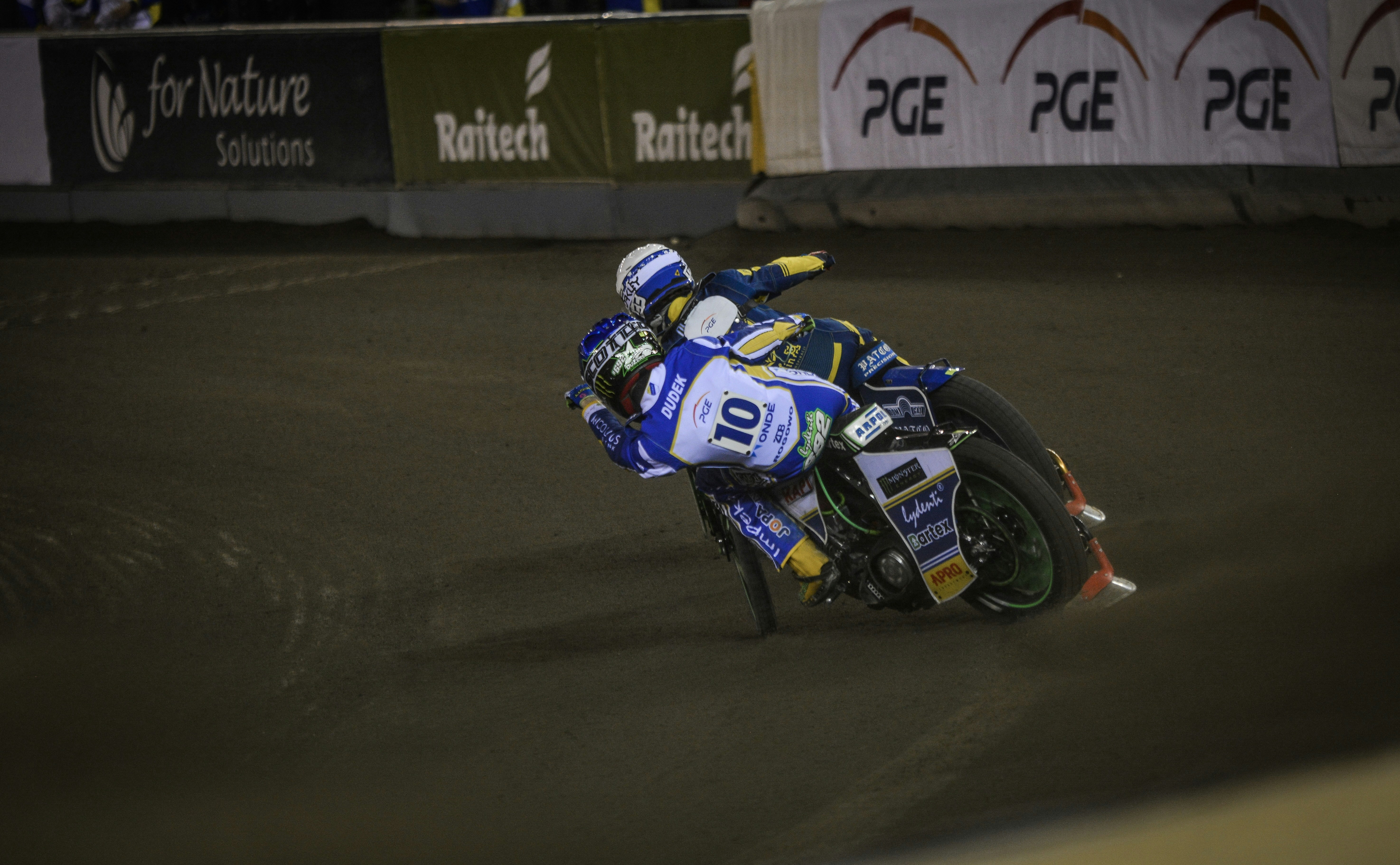 A person riding a motorcycle on a race track photo – Free Motorcycle ...