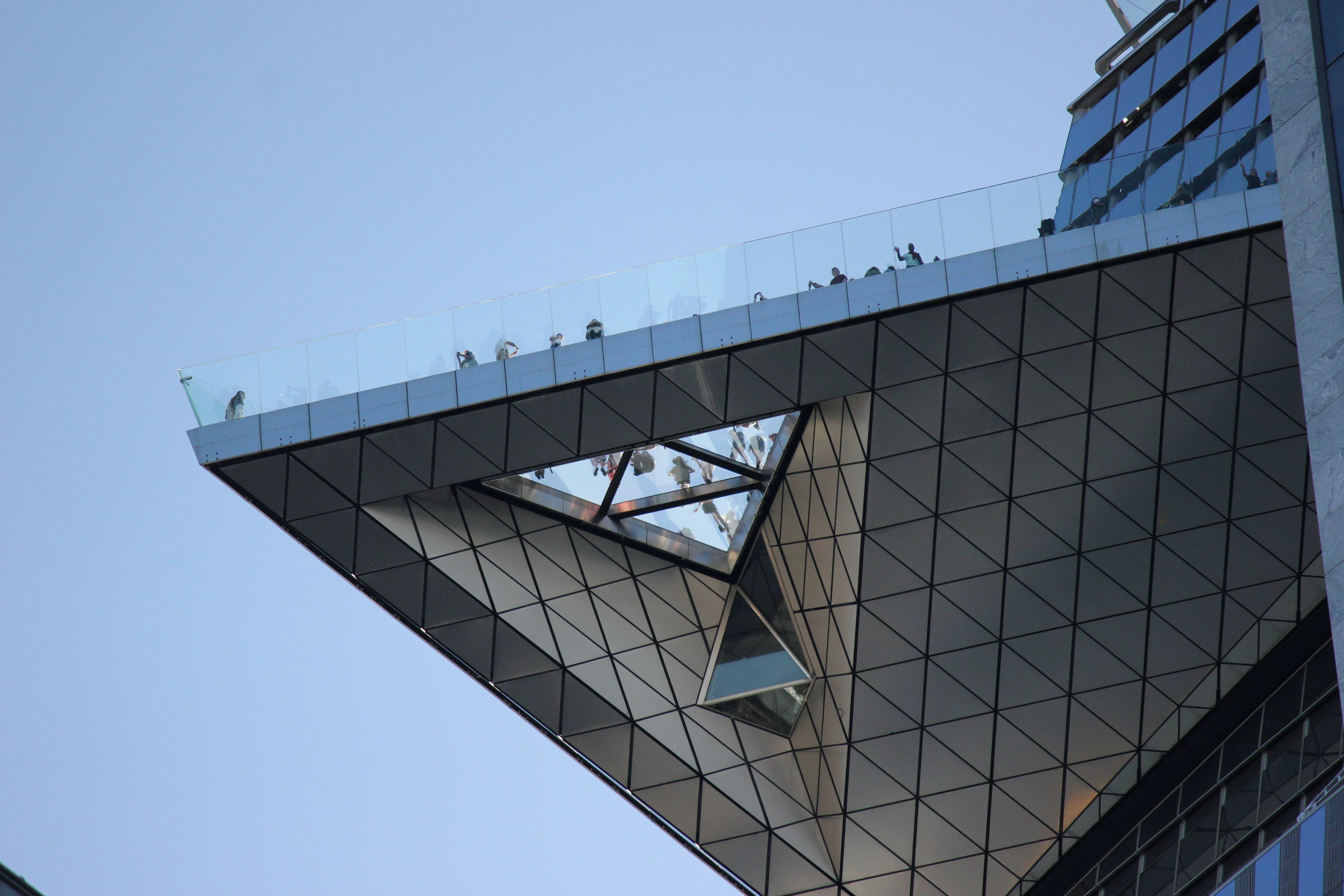 Geometric Heights: A Glass-Encased Skywalk