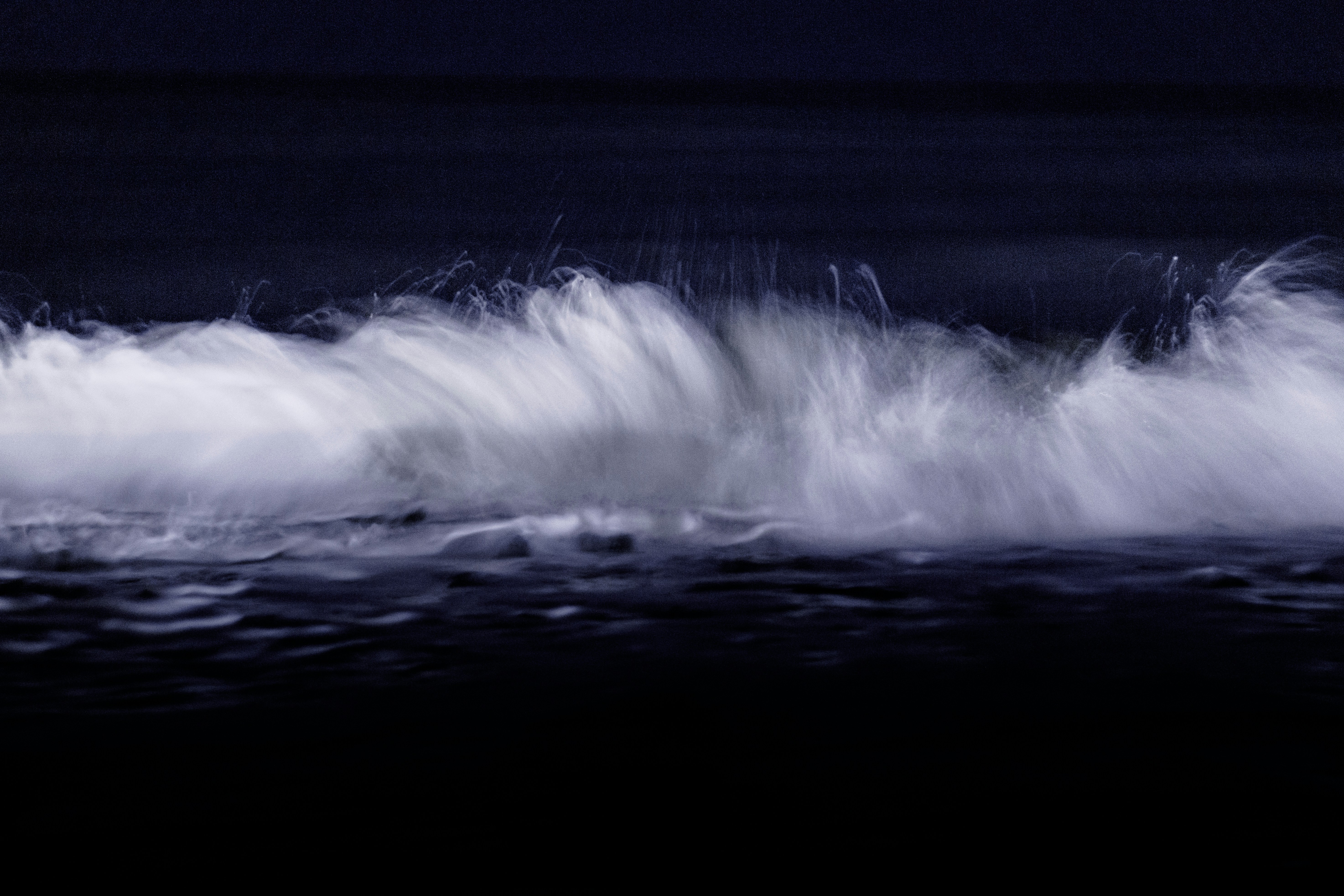 A large wave is coming towards the shore photo – Free Grey Image on ...