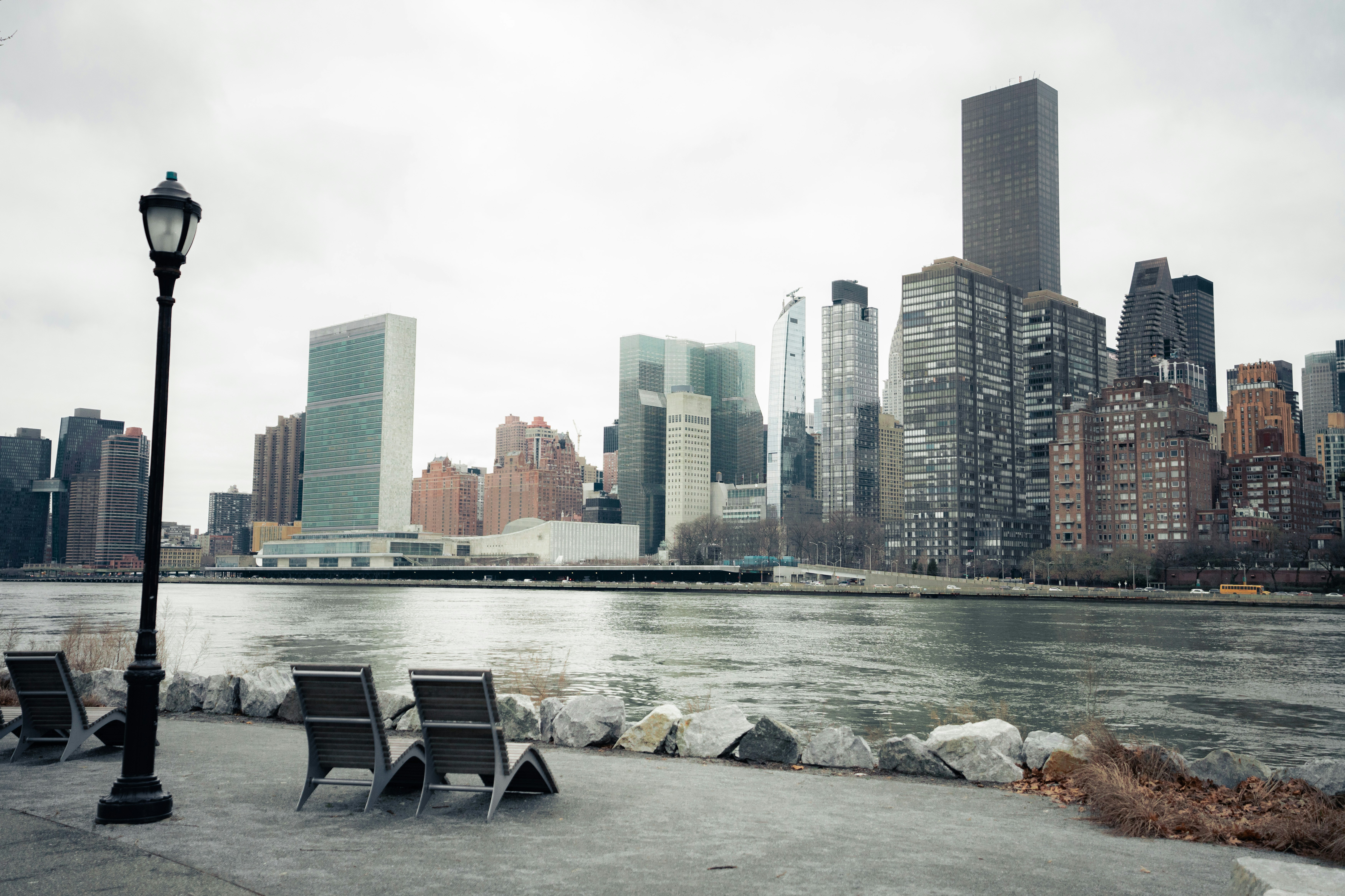 Manhattan Horizons: Riverside View of Glass and Stone