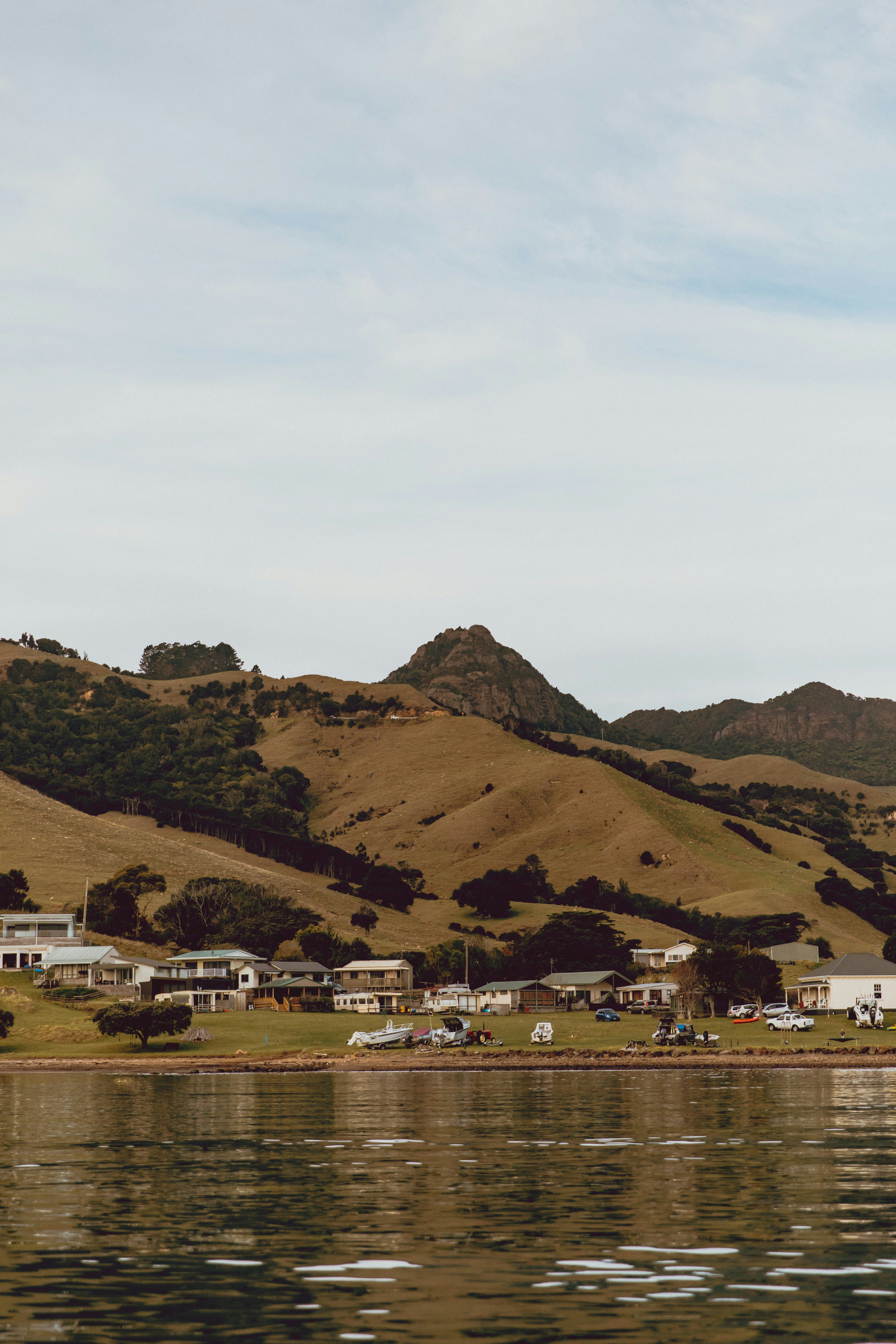 Hushed Hillside Village by a Quiet Shore