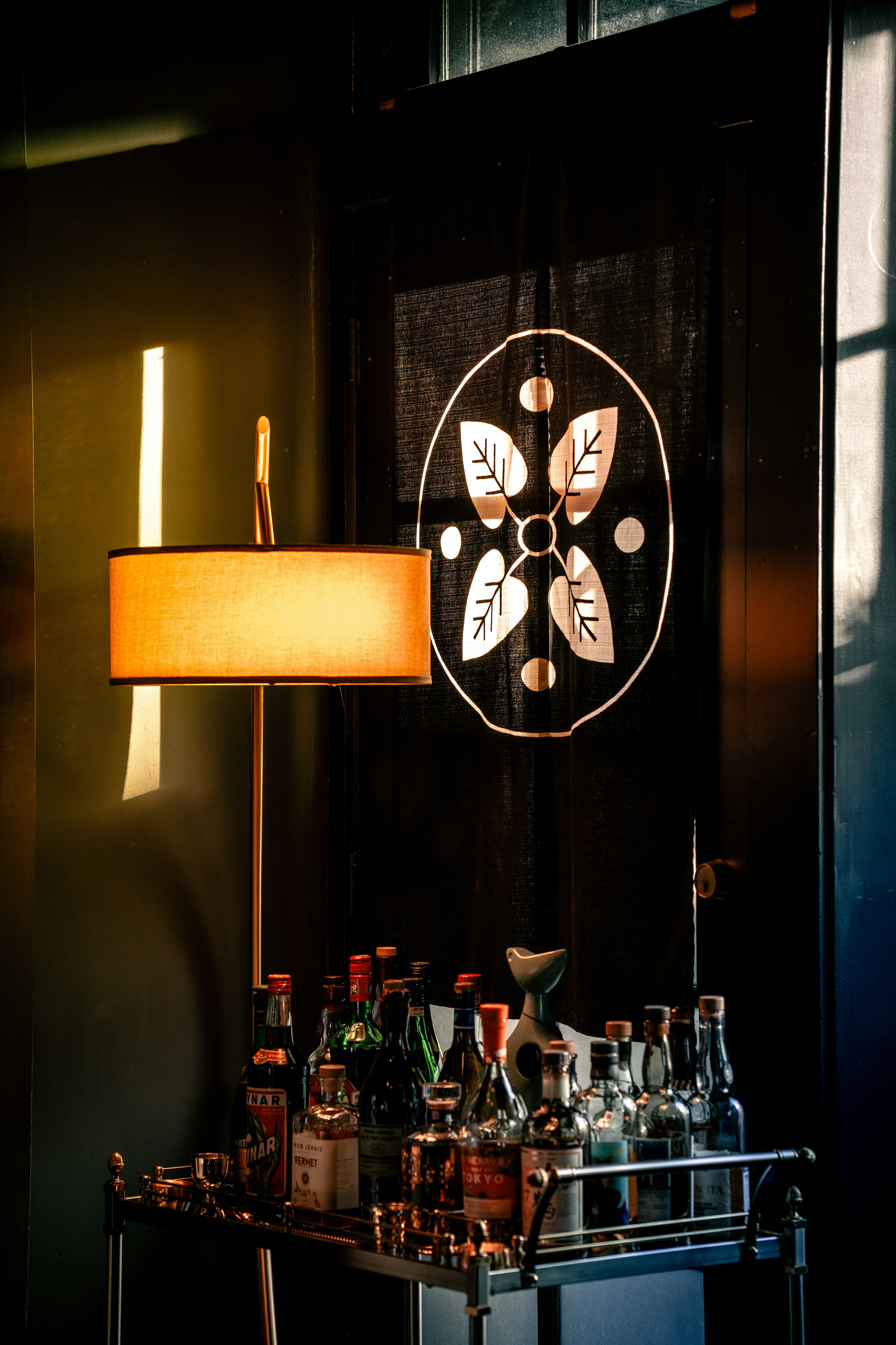 Amber Lantern Casts a Warm Glow Across the Bar Cart