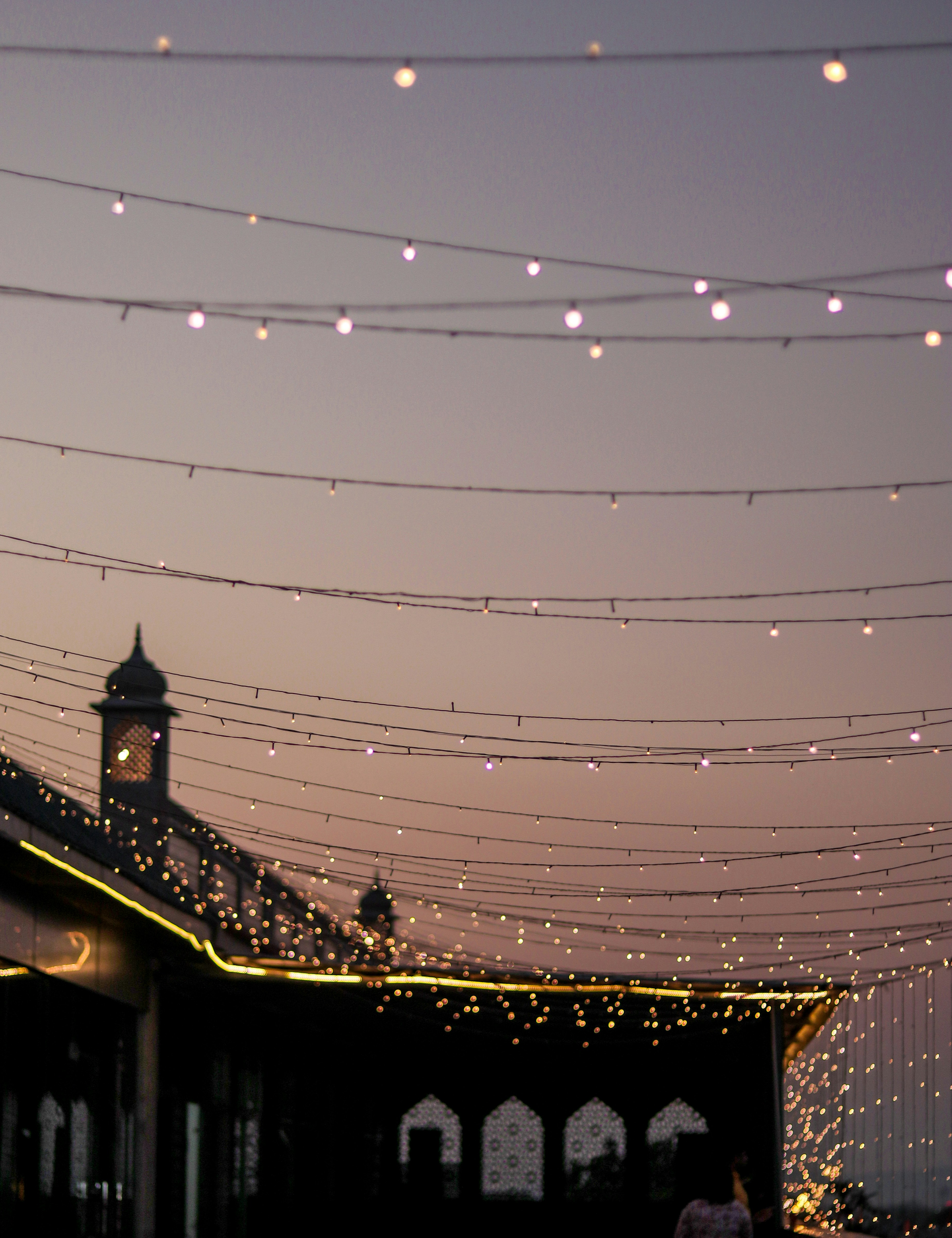 Dusk Lanterns Draped Across a Quiet Pavilion