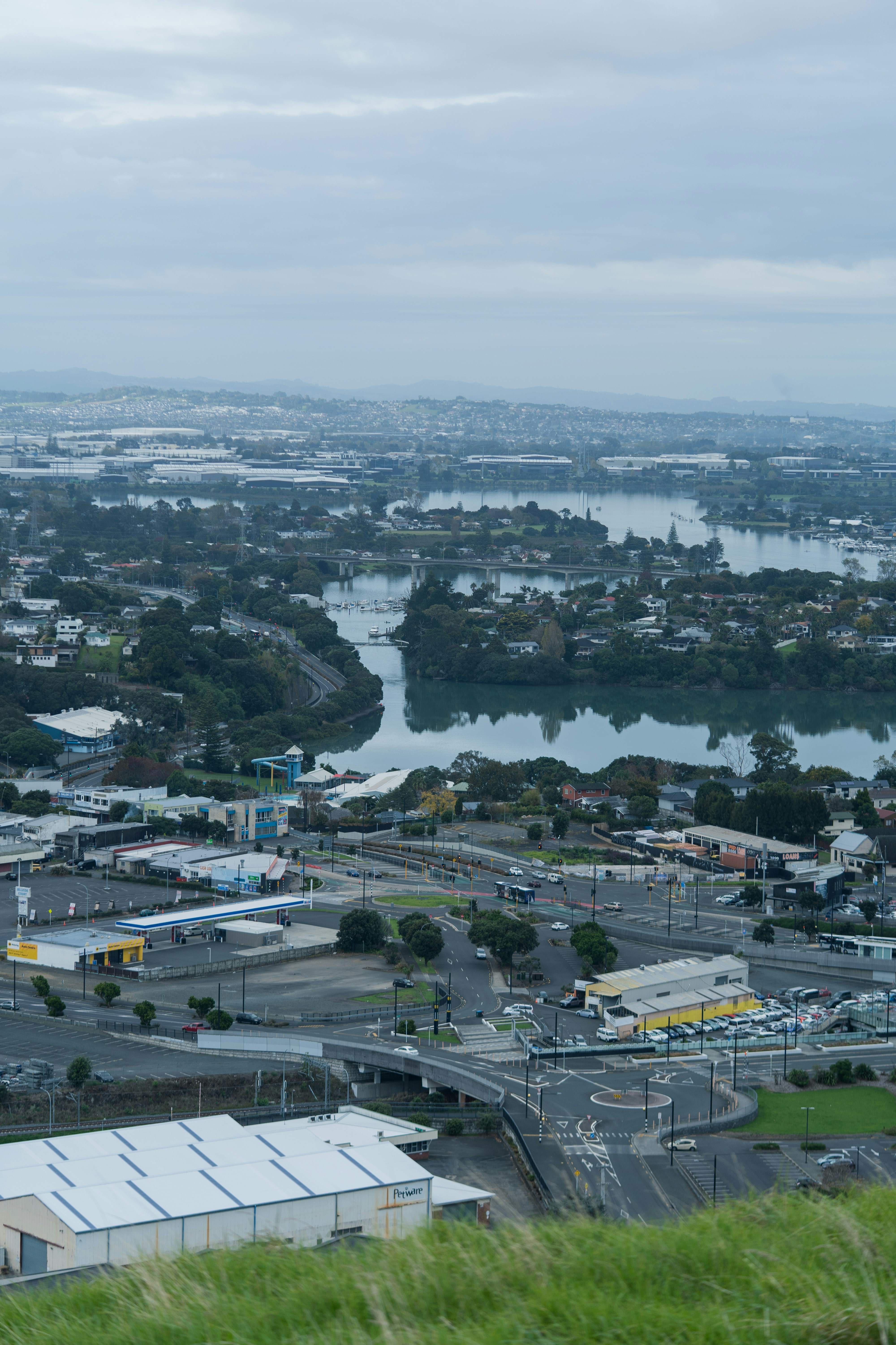 An aerial view of a city with a lake in the background photo – Free ...