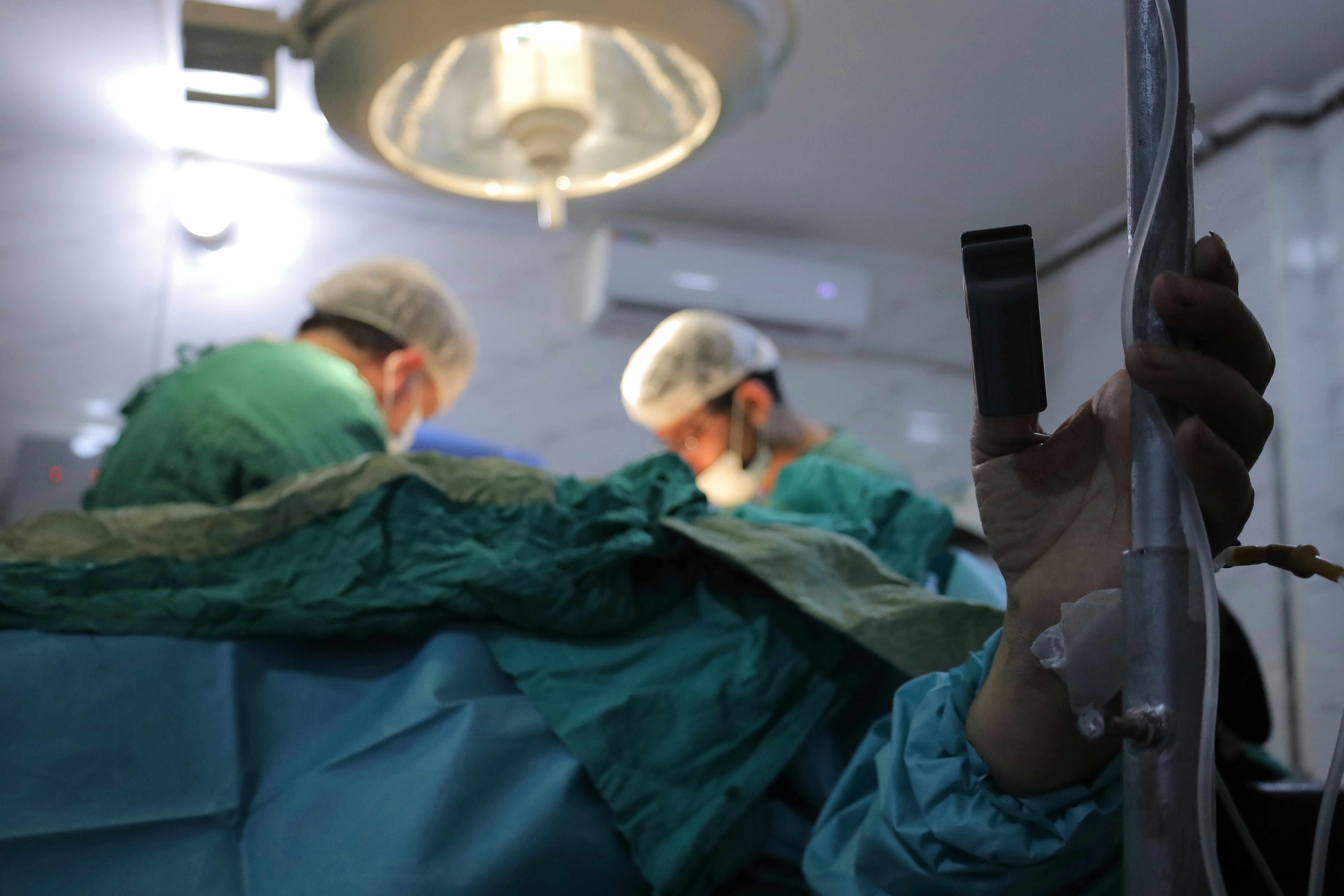 A couple of surgeons in a hospital operating photo – Free إدلب، syria ...