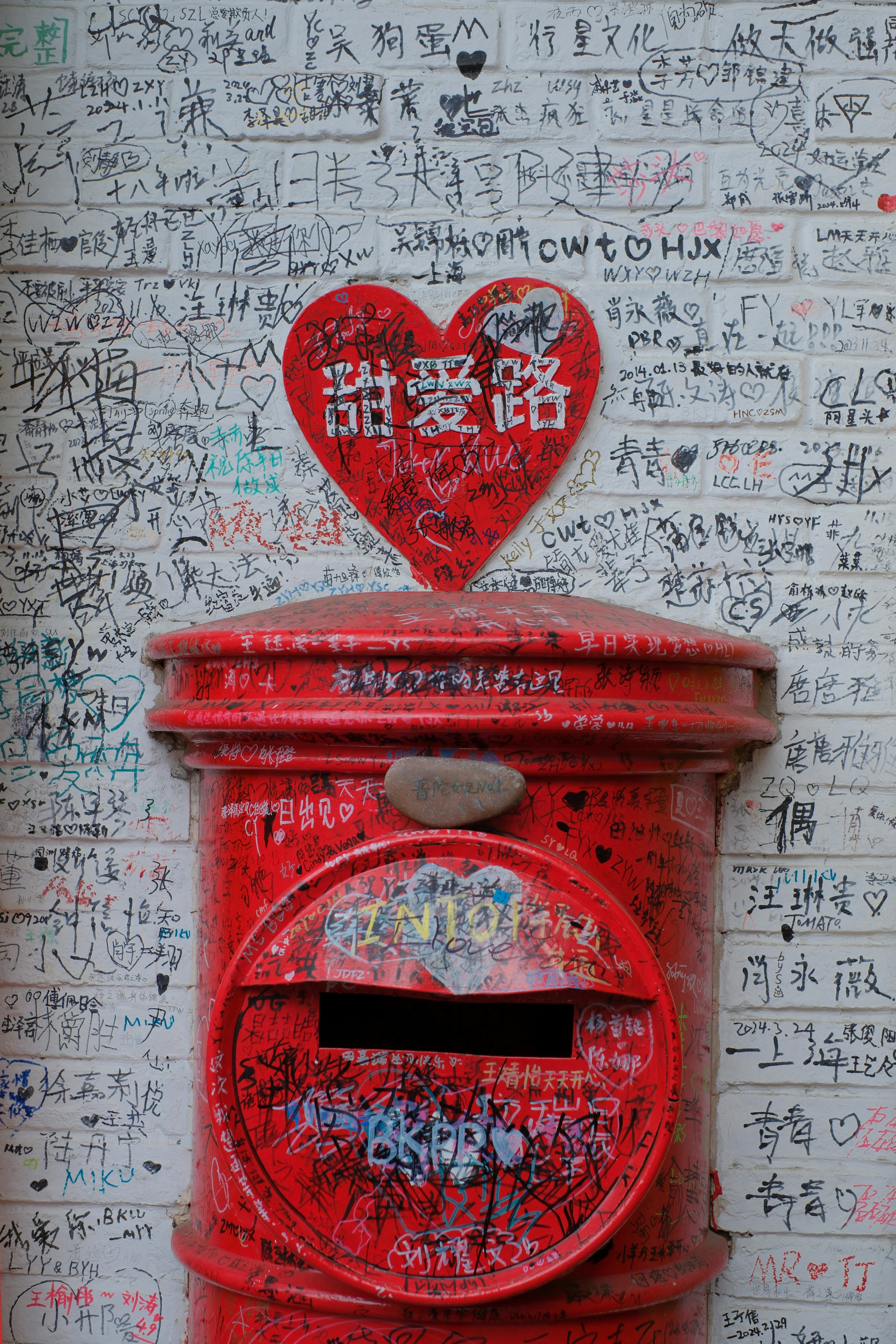 A red mailbox with a heart on top of it photo – Free Brown Image on ...