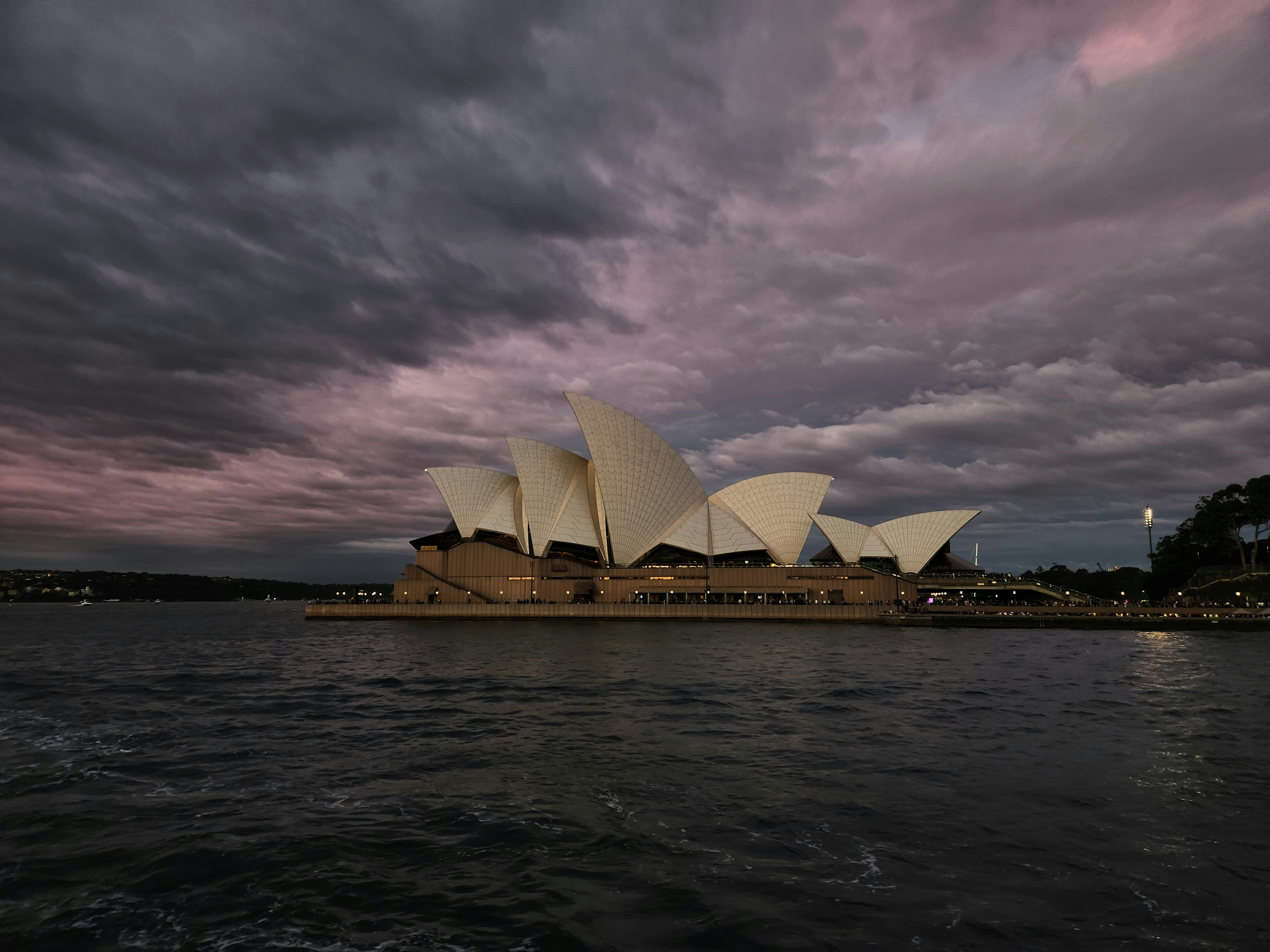 The sydney opera house under a cloudy sky photo – Free Australia Image ...