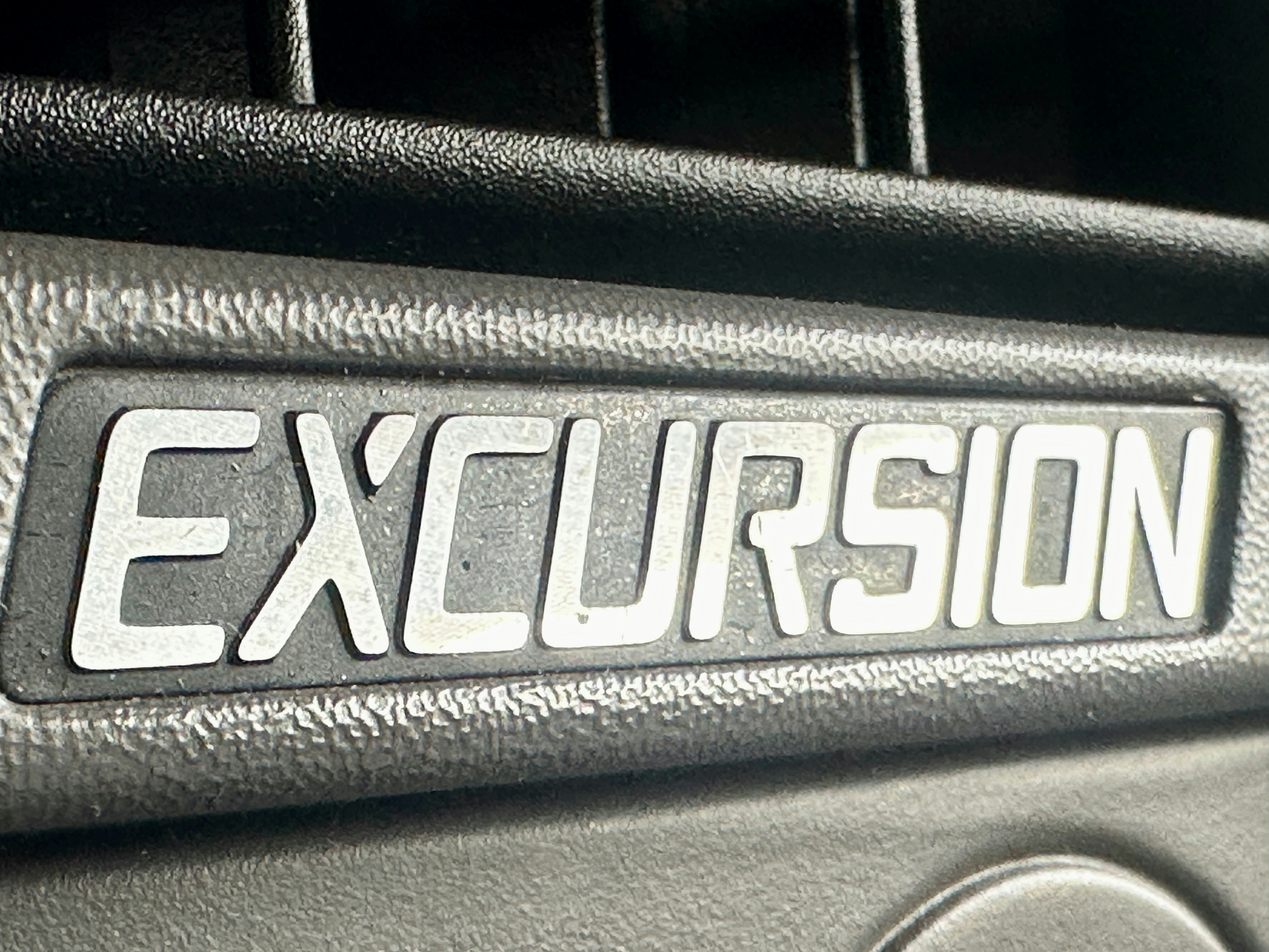 A close up of the word excursion on a vehicle photo – Free Expedition ...