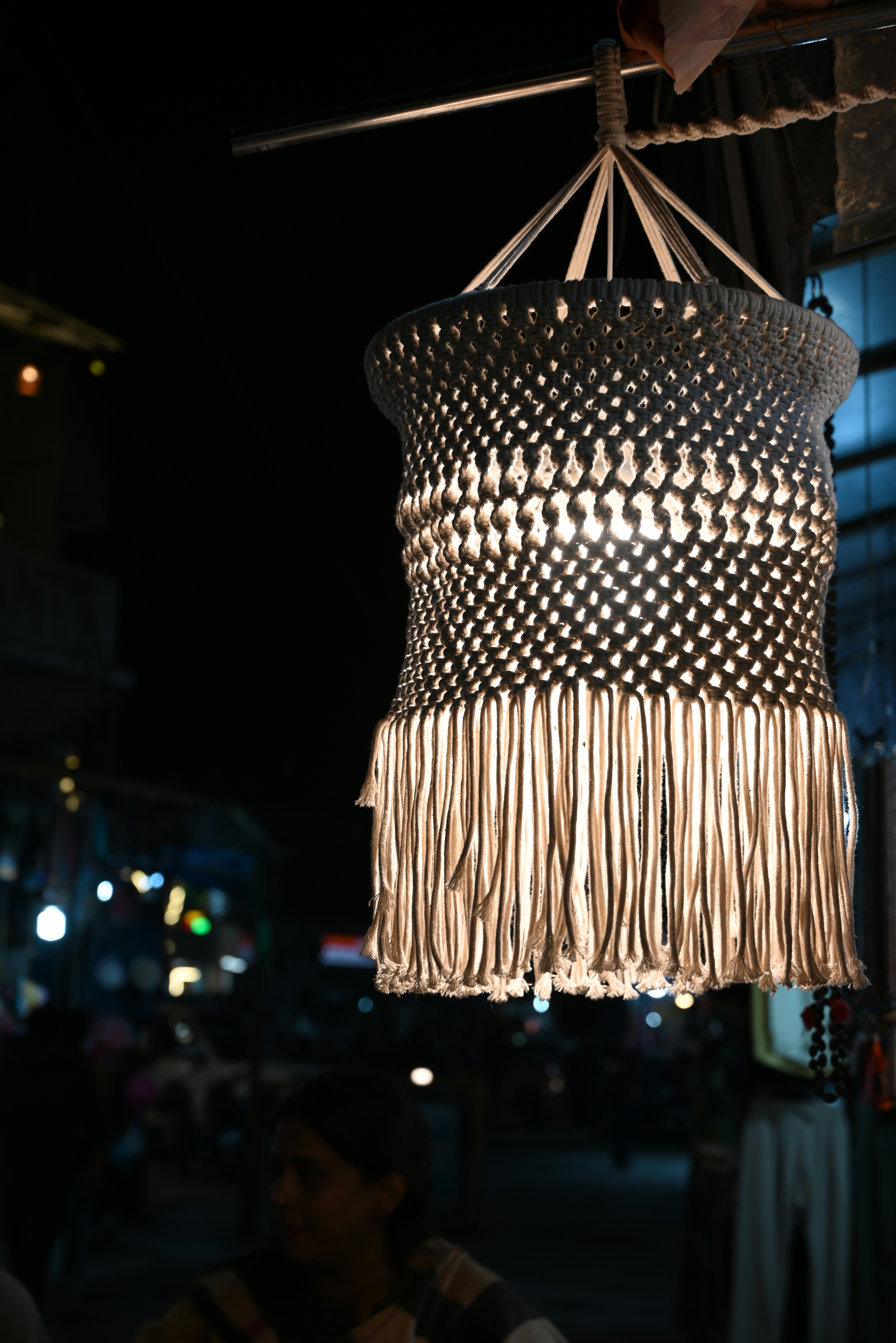 Fringe-Woven Pendant Light Illuminates a Nocturnal Market