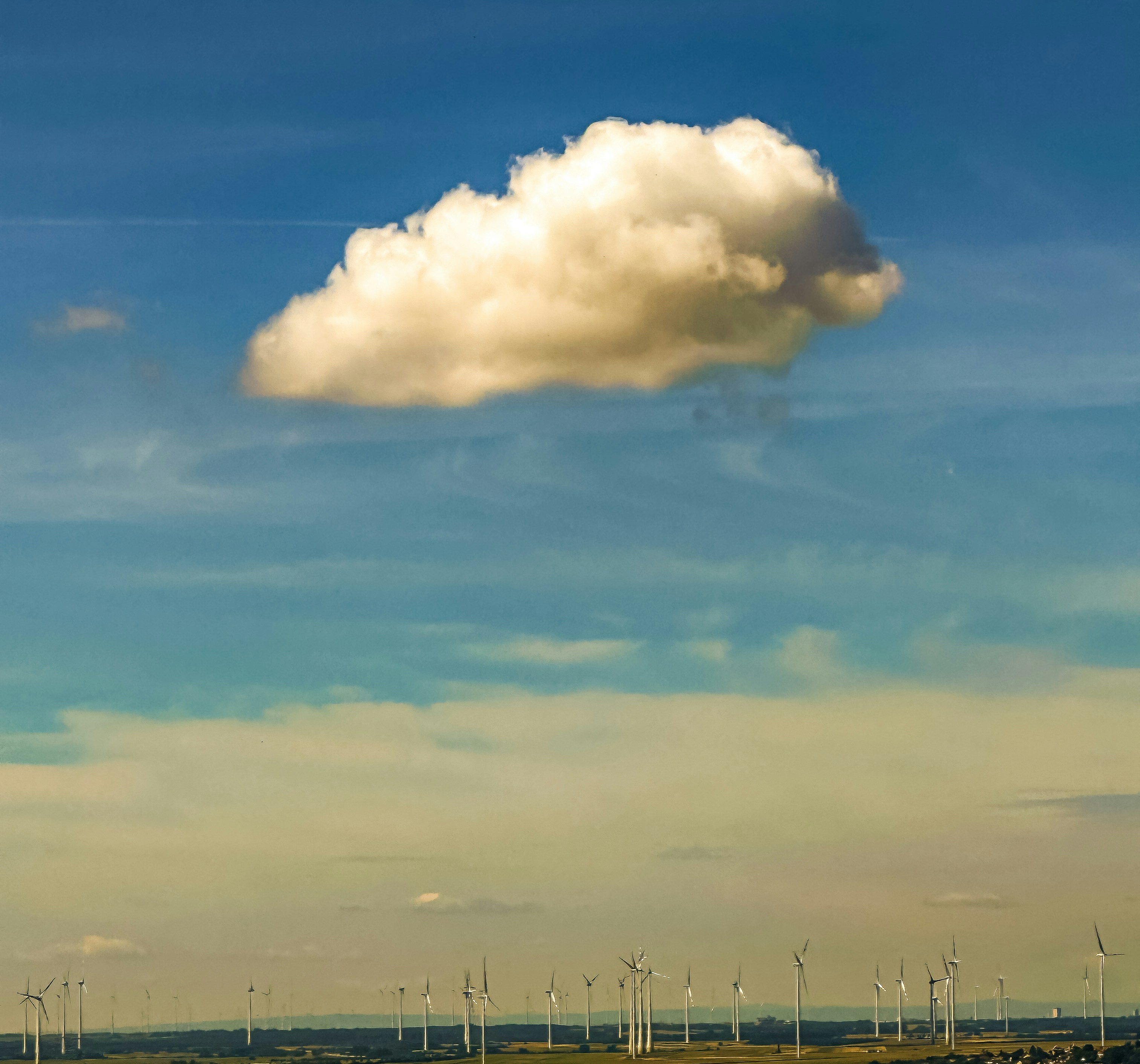 Cloud Crown Over a Wind Farm Horizon
