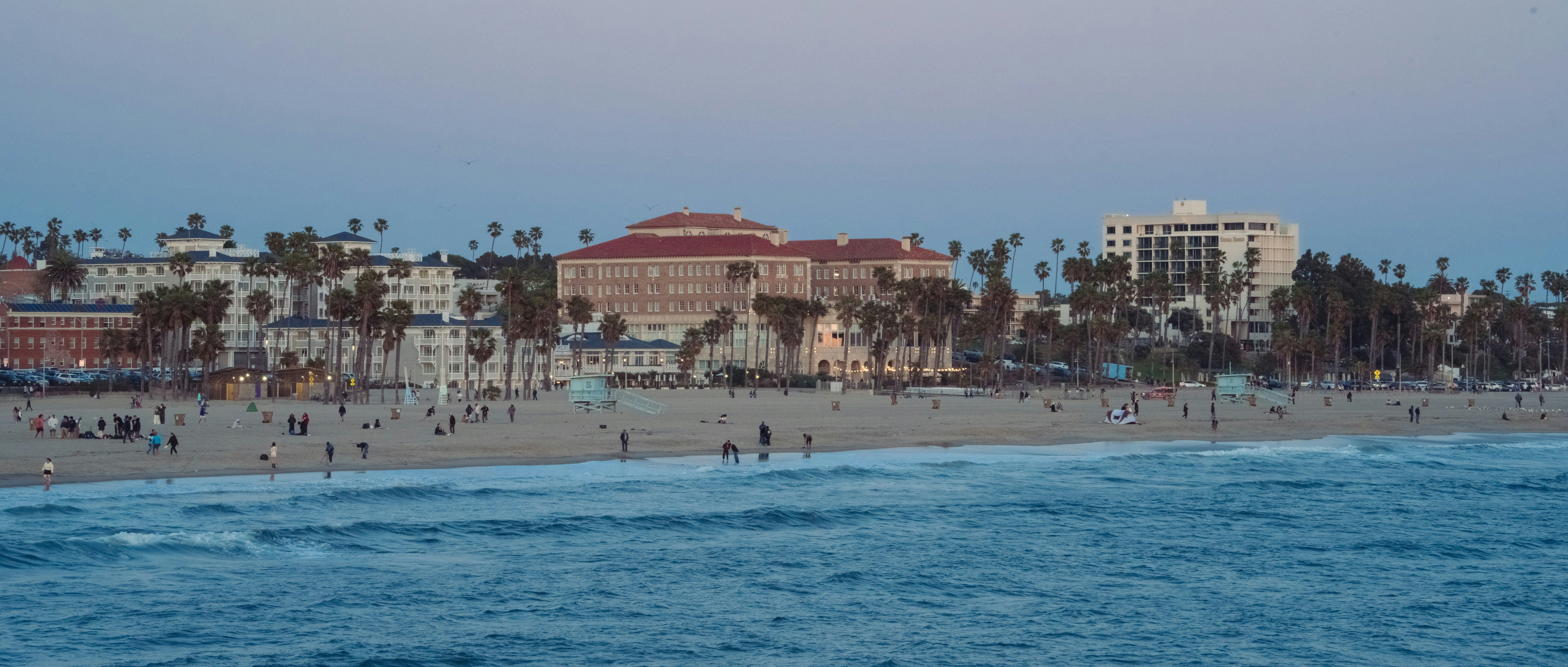 Red Roofs at the Palm-Lined Beachfront Promenade
