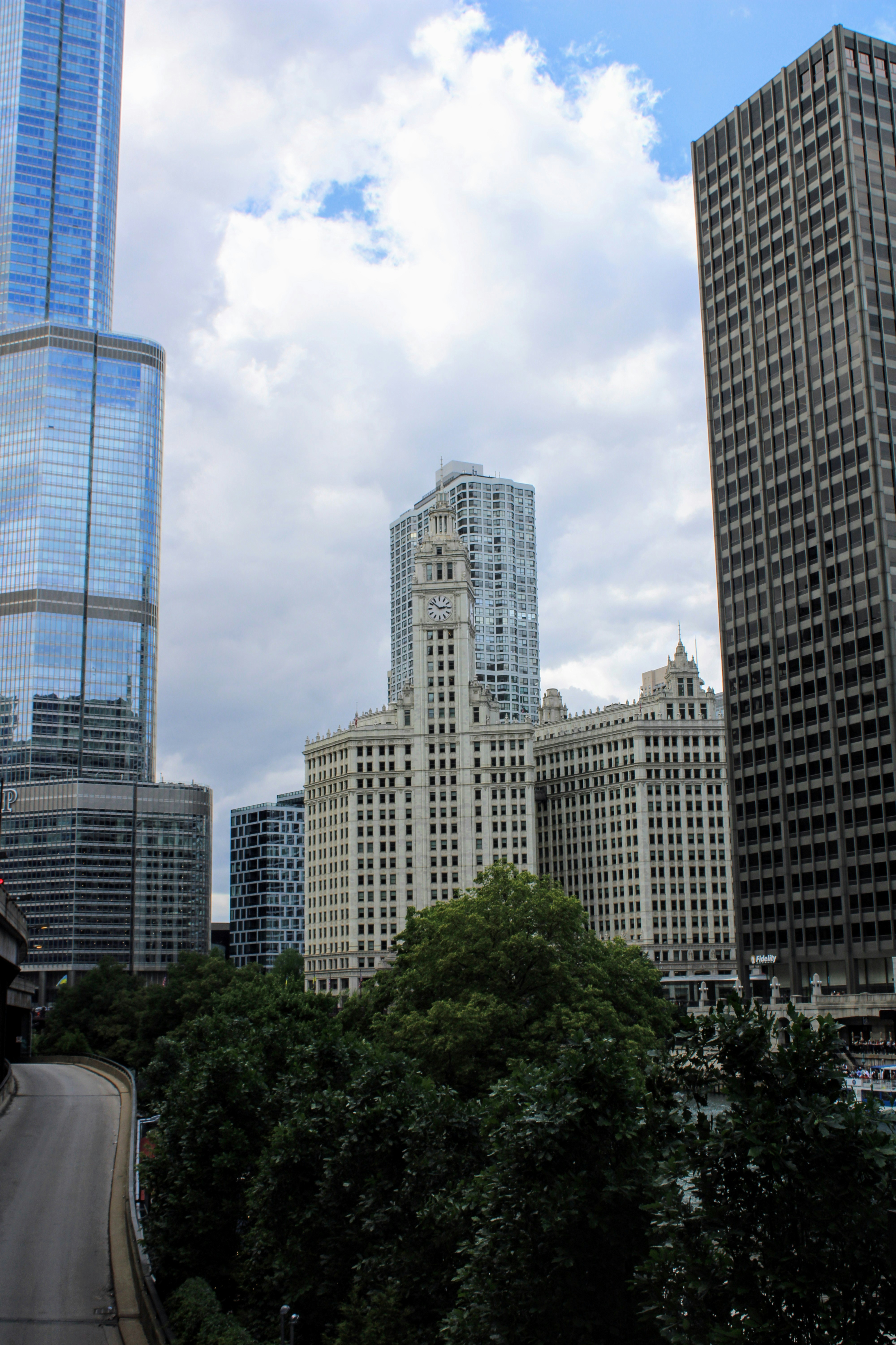 A view of some very tall buildings in a big city photo – Free Blue ...