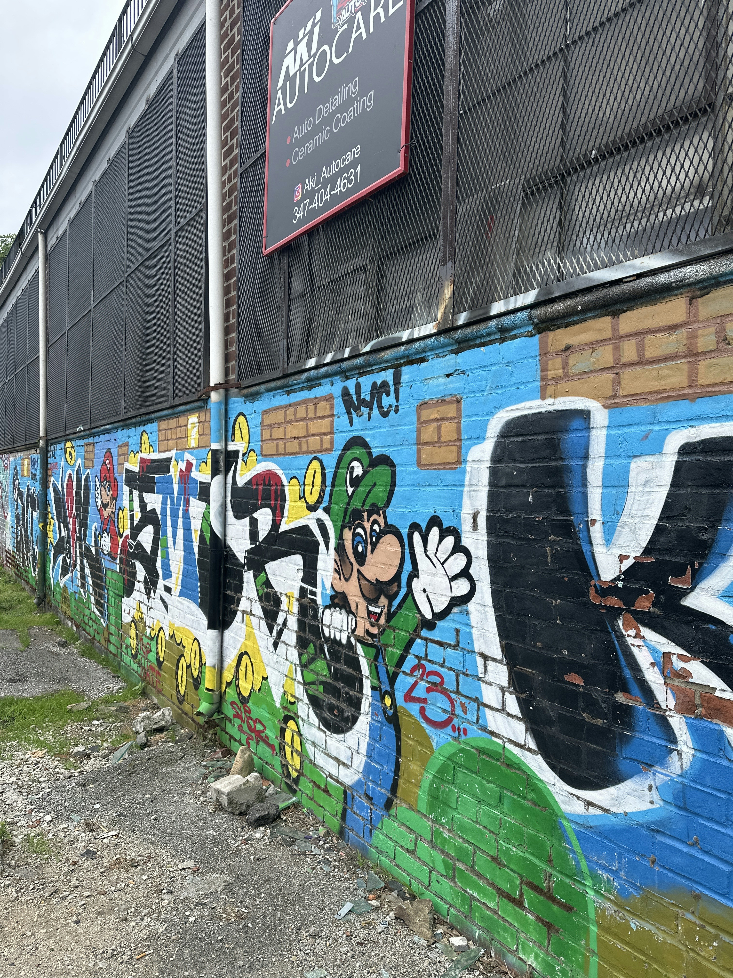 A wall that has a bunch of graffiti on it photo – Free Building Image ...