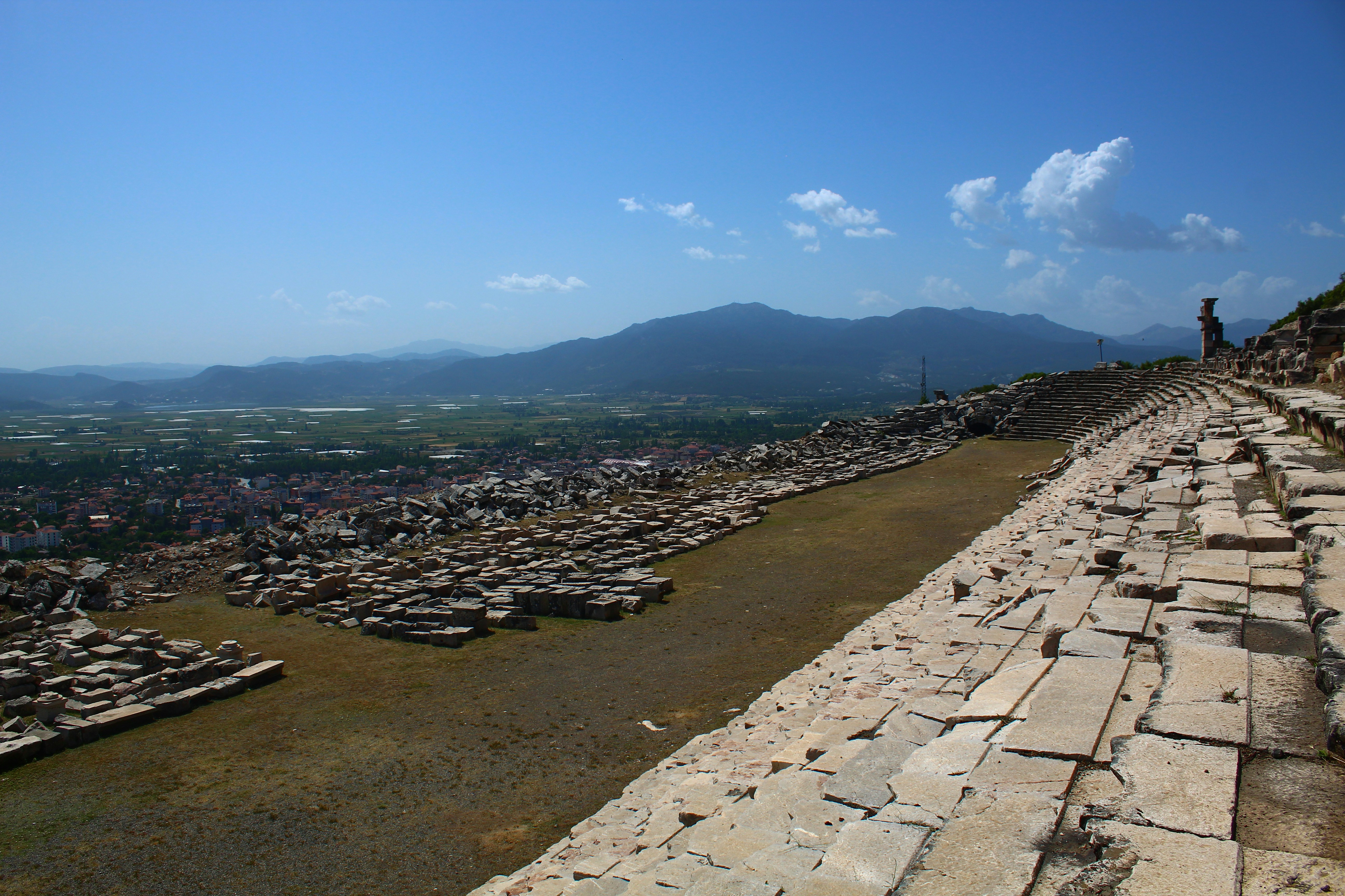 Edge Staircase of the Terrace: A Lone Figure Reaches for the Distant Valley