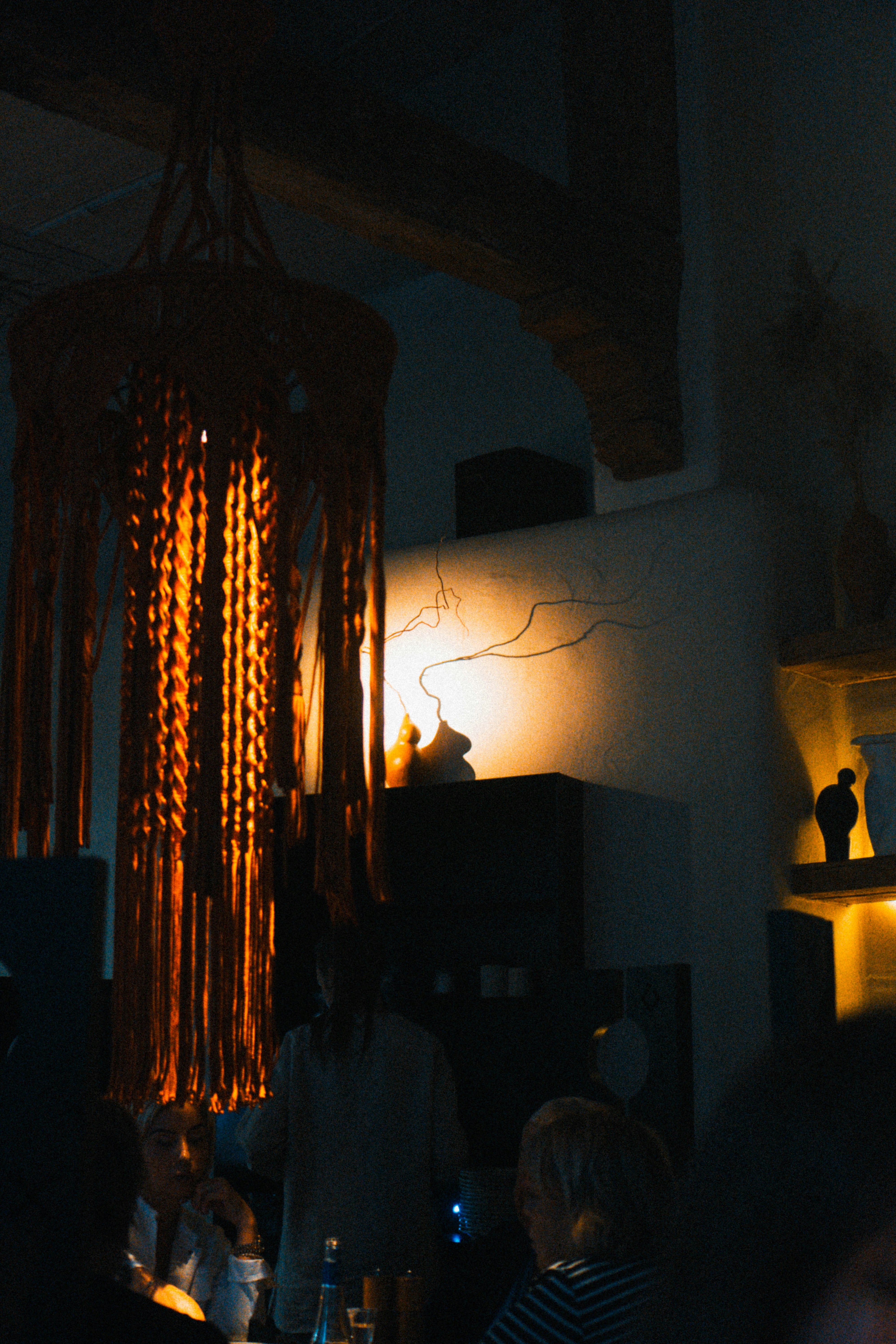 Amber Threads Draped Over a Quiet Café